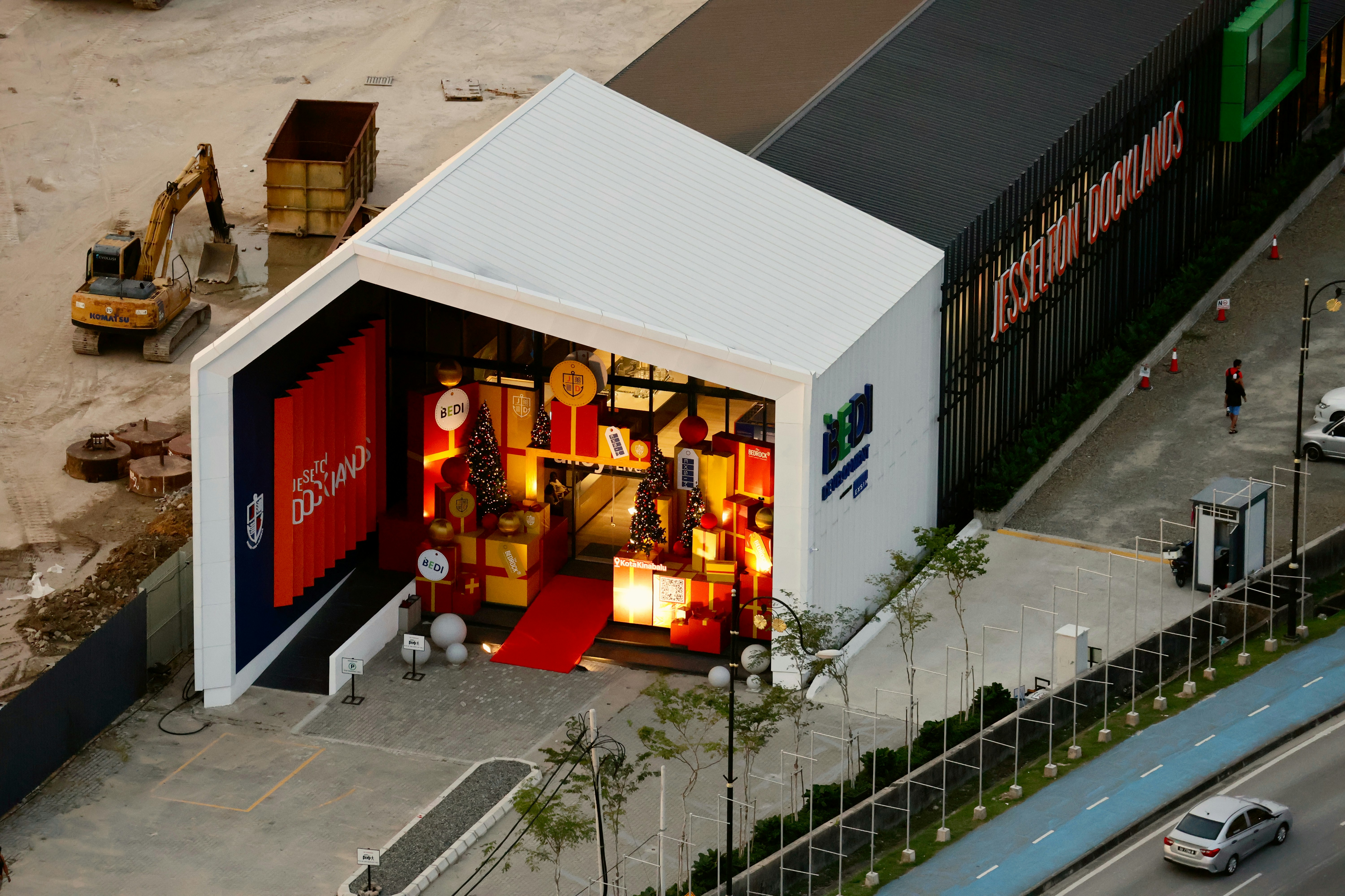 Exhibit Hall Amid Construction: Aerial View of a Brightly Decorated Pavilion