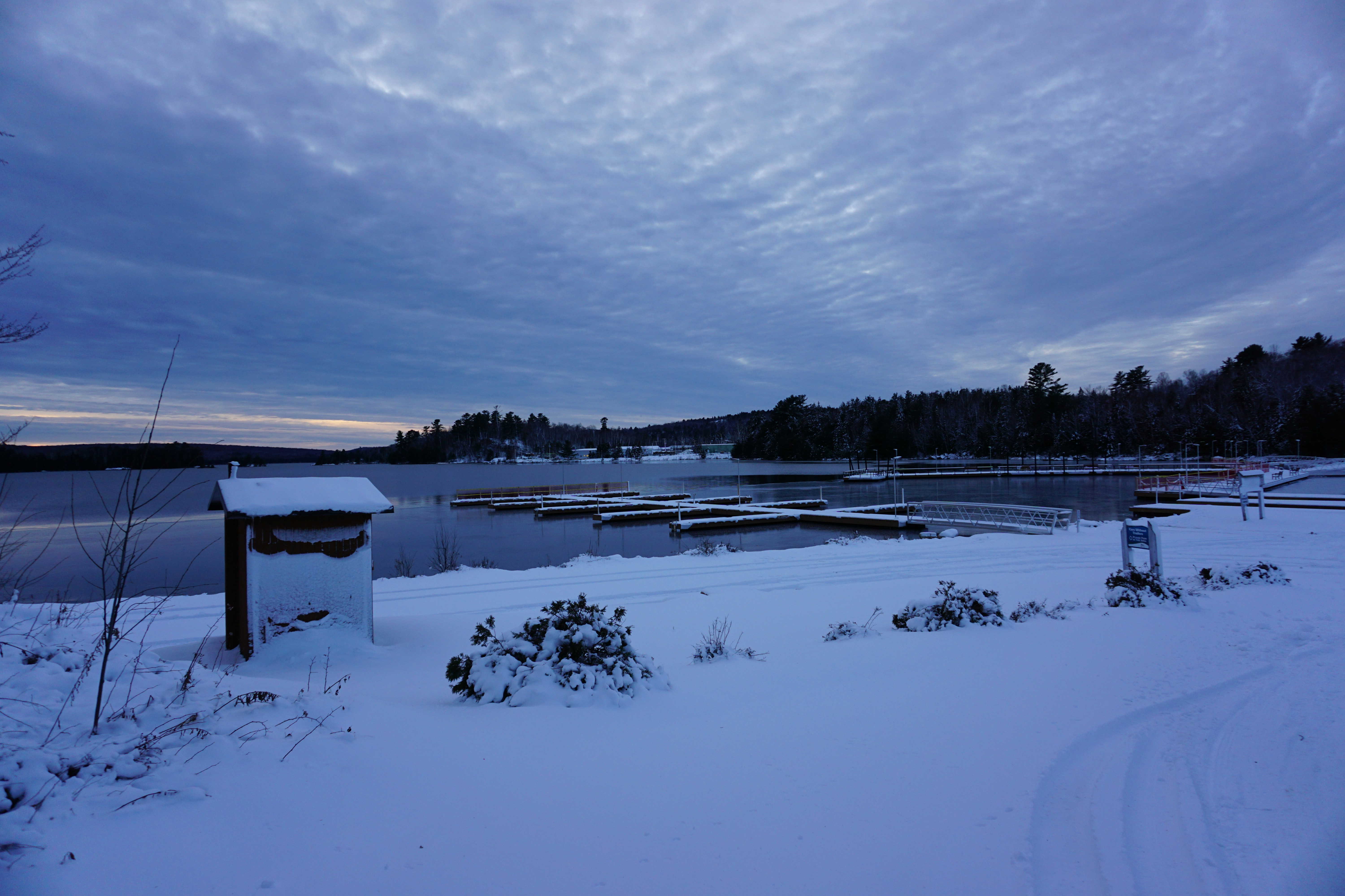 Winter Marina Looming Under an Expansive Sky
