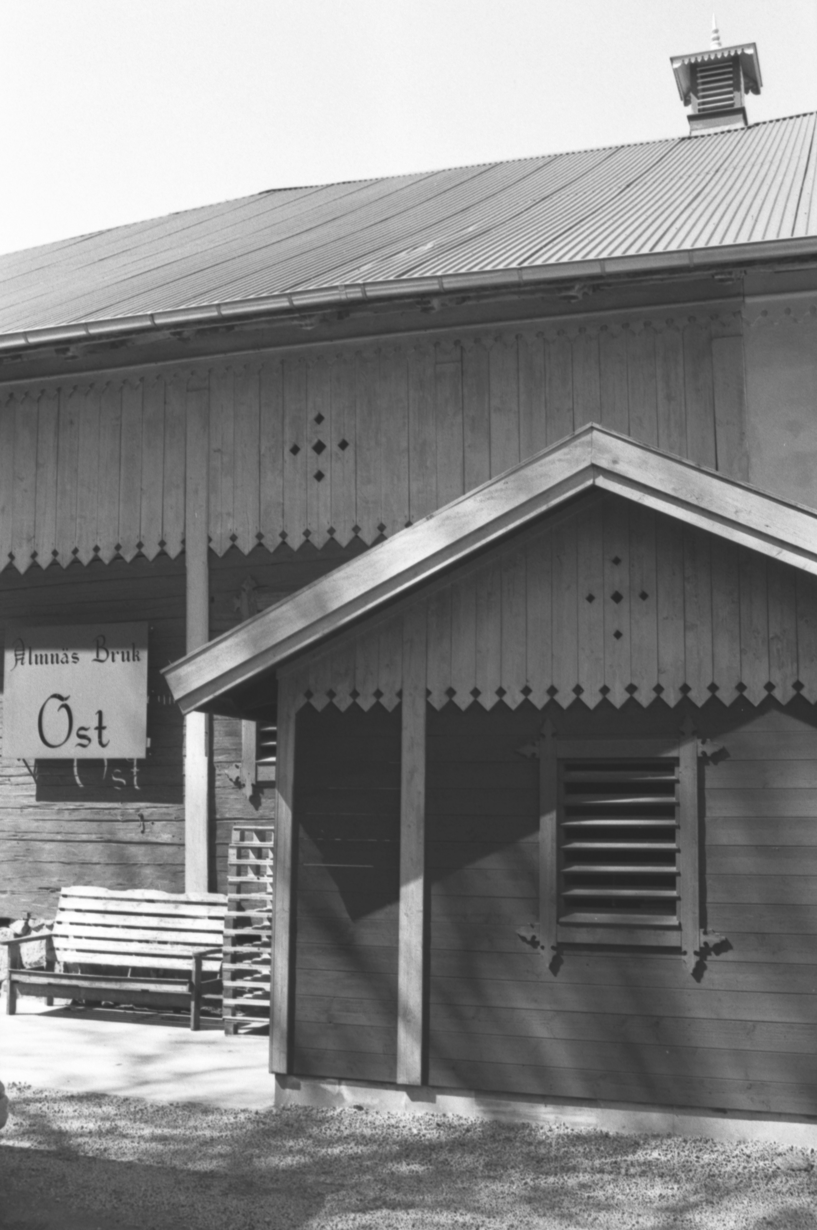 Weathered Timber: A Quiet Facade Under a Sloped Roof