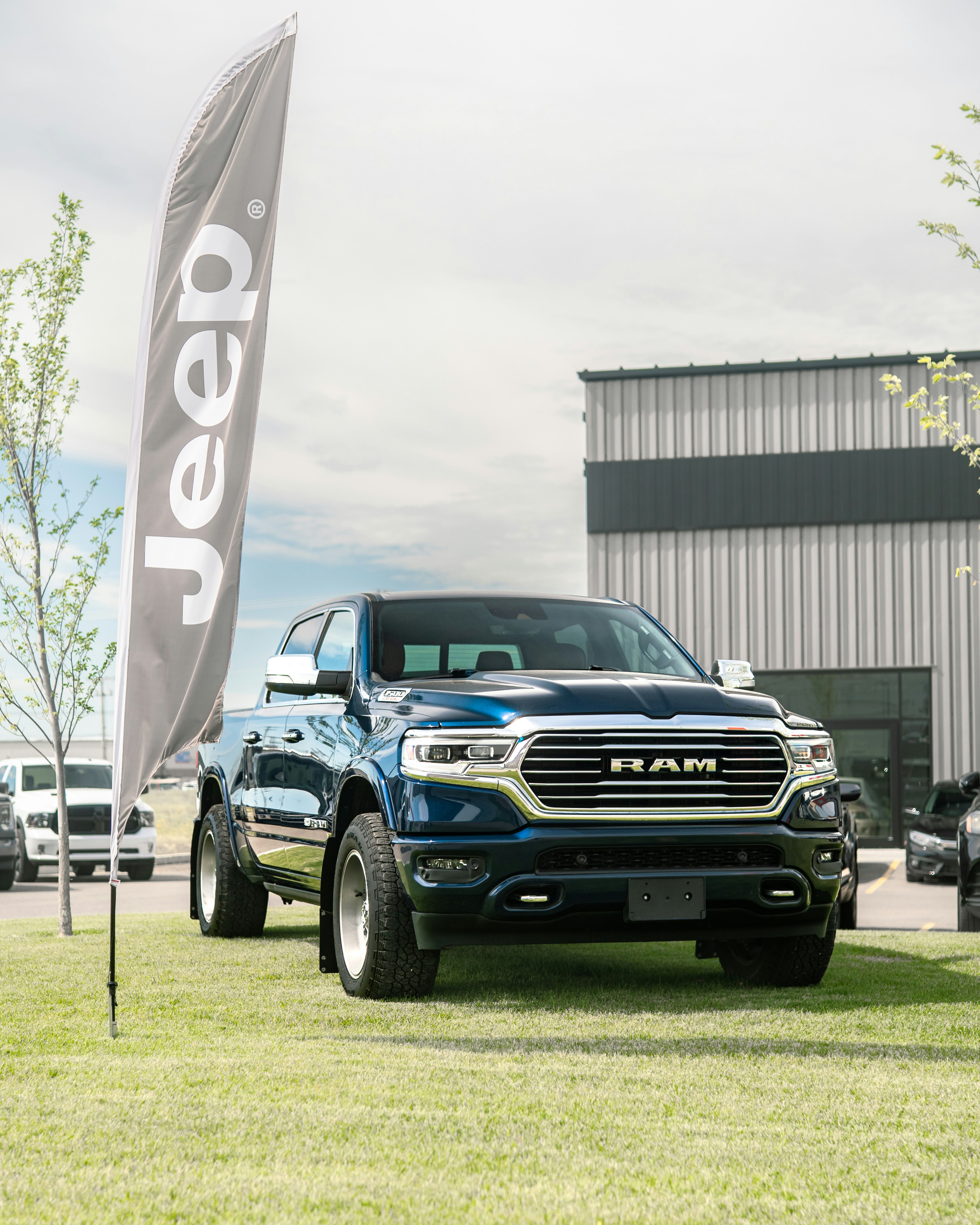 Bold RAM Pickup Anchored by a Prominent Jeep Flag