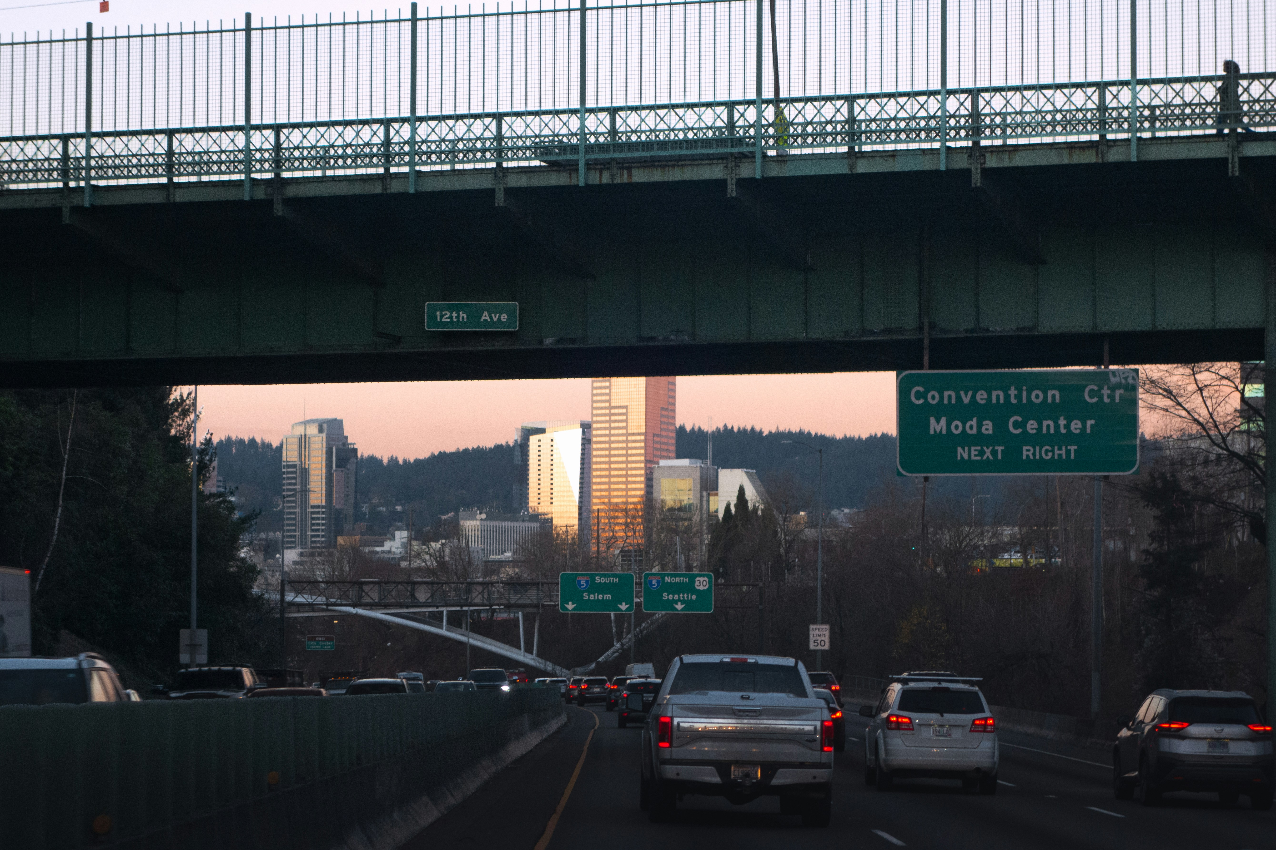 Cityscape Rising Over the Highway at Dusk