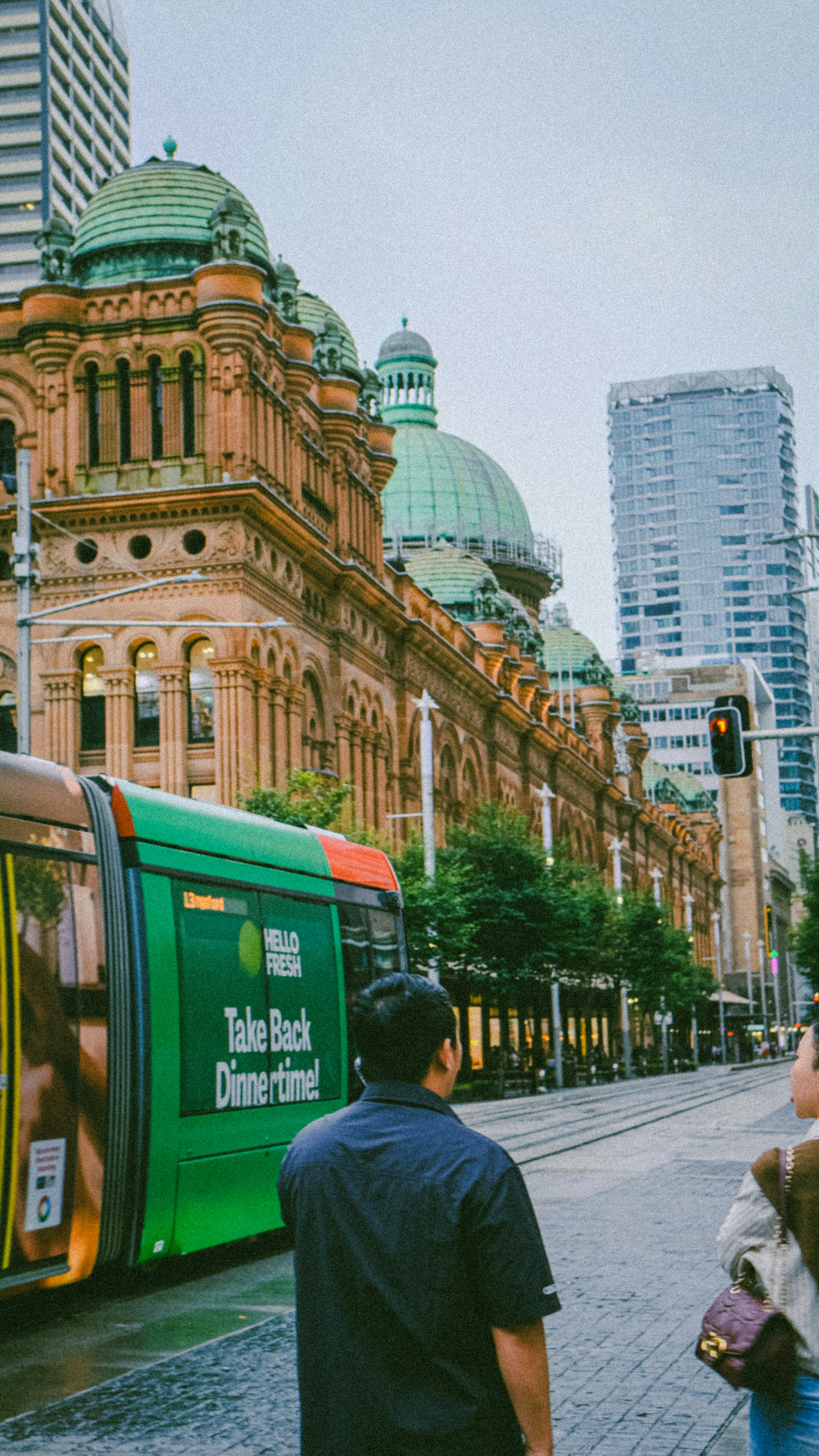 Heritage Facades Meet Modern Transit: A City Street Snapshot