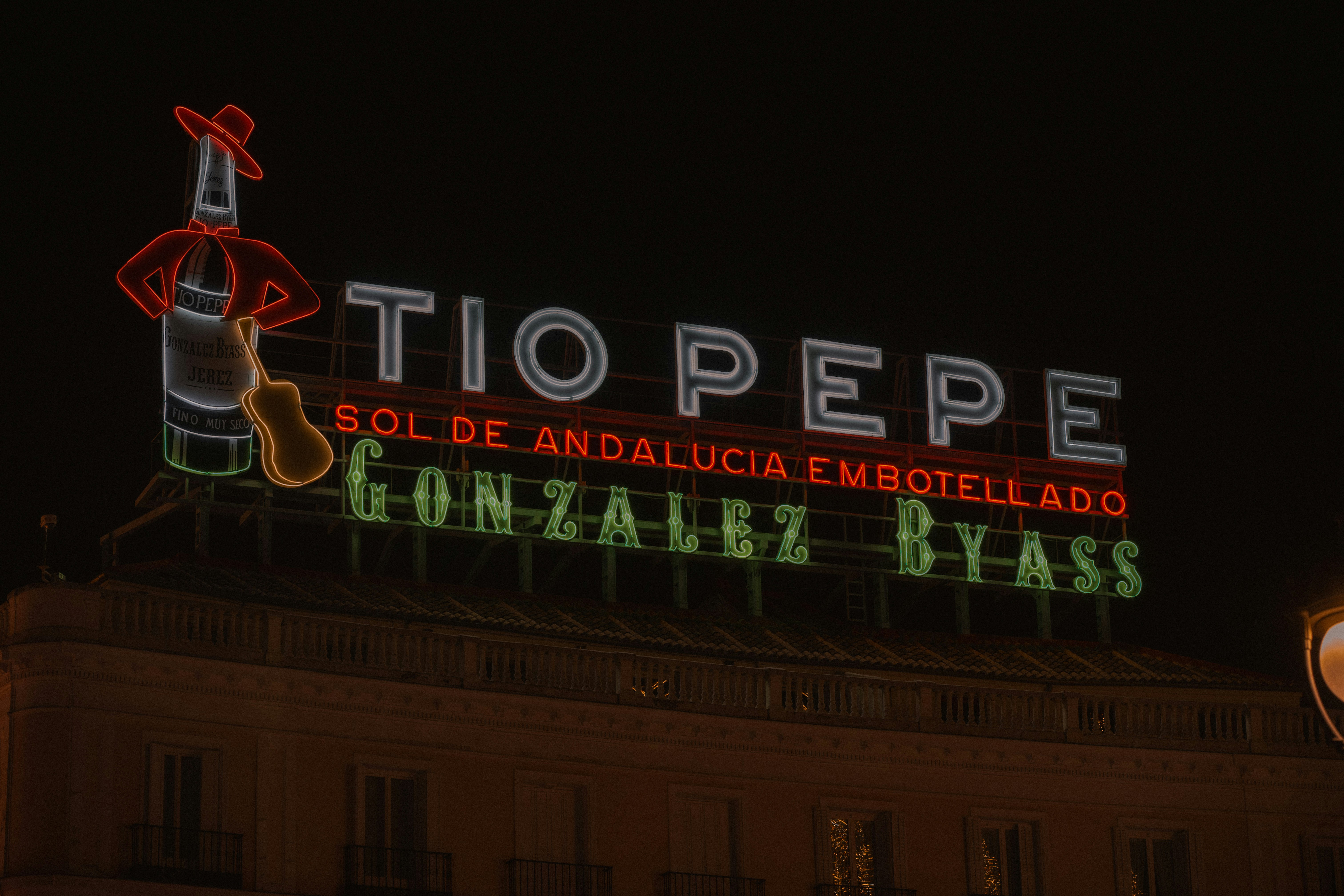 Neon Signage on a Dark Madrid Night