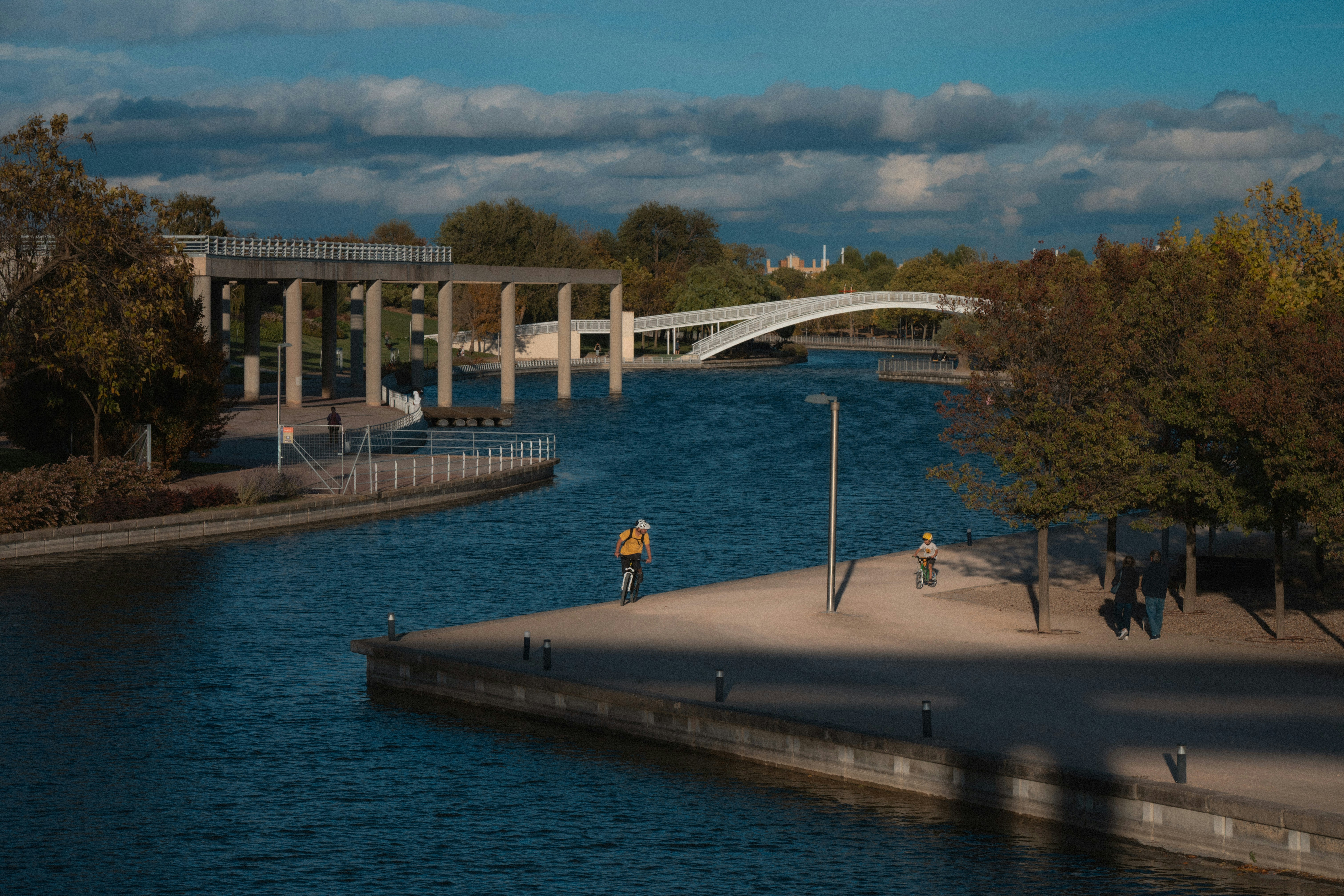 Harbor Promenade: A Quiet Moment by the Blue River