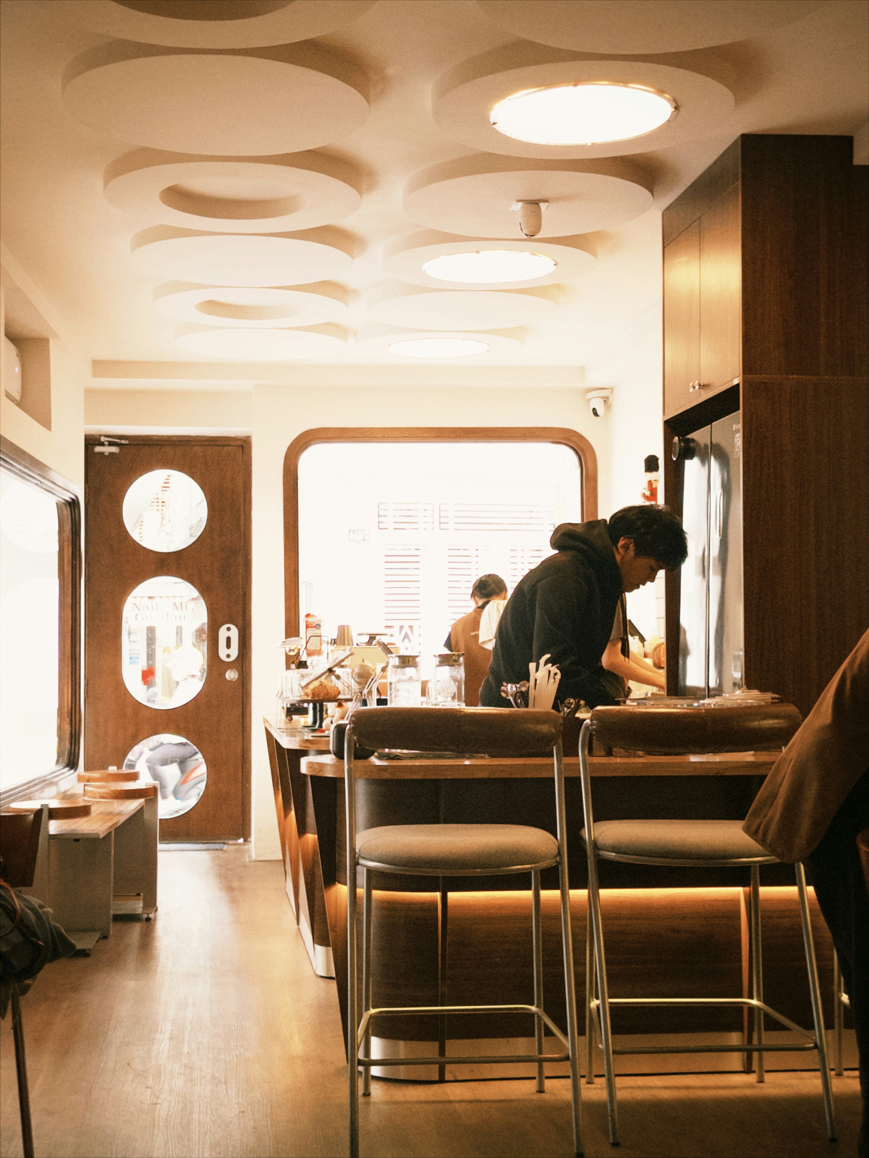 Quiet Barista spotlight in a warm, retro cafe