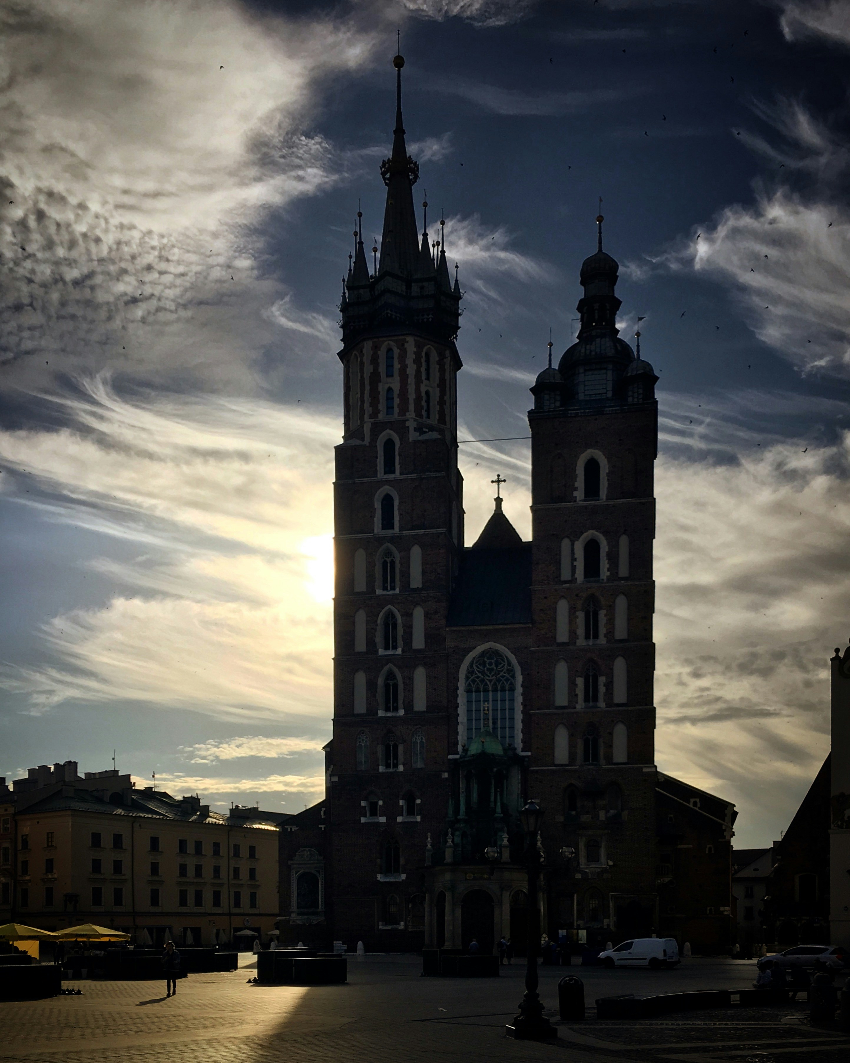 Cathedral Silhouette at Sunset Behind a Central Square
