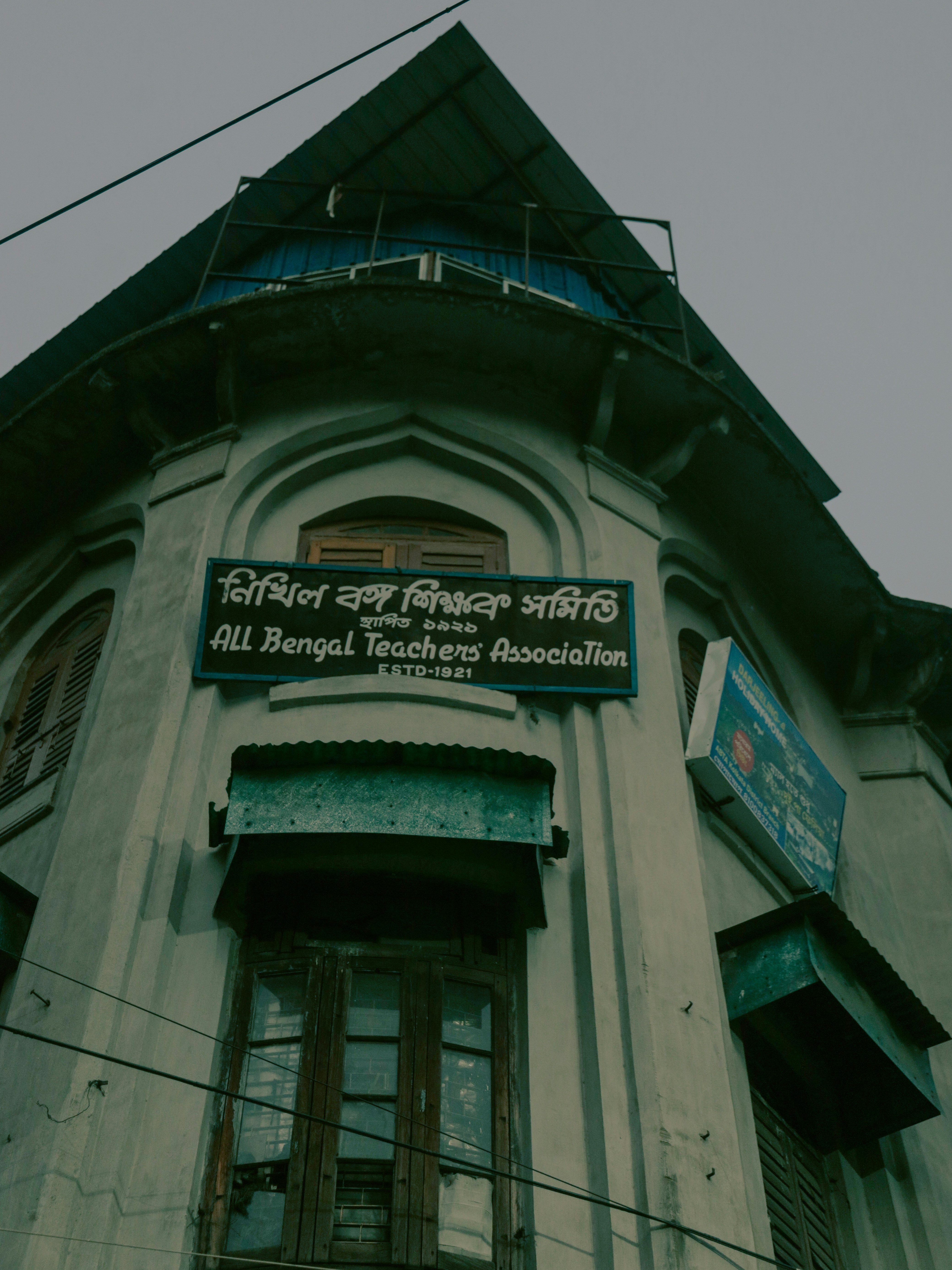 Heritage Facade: Old Bengal Teachers Association Sign on a Weathered Building