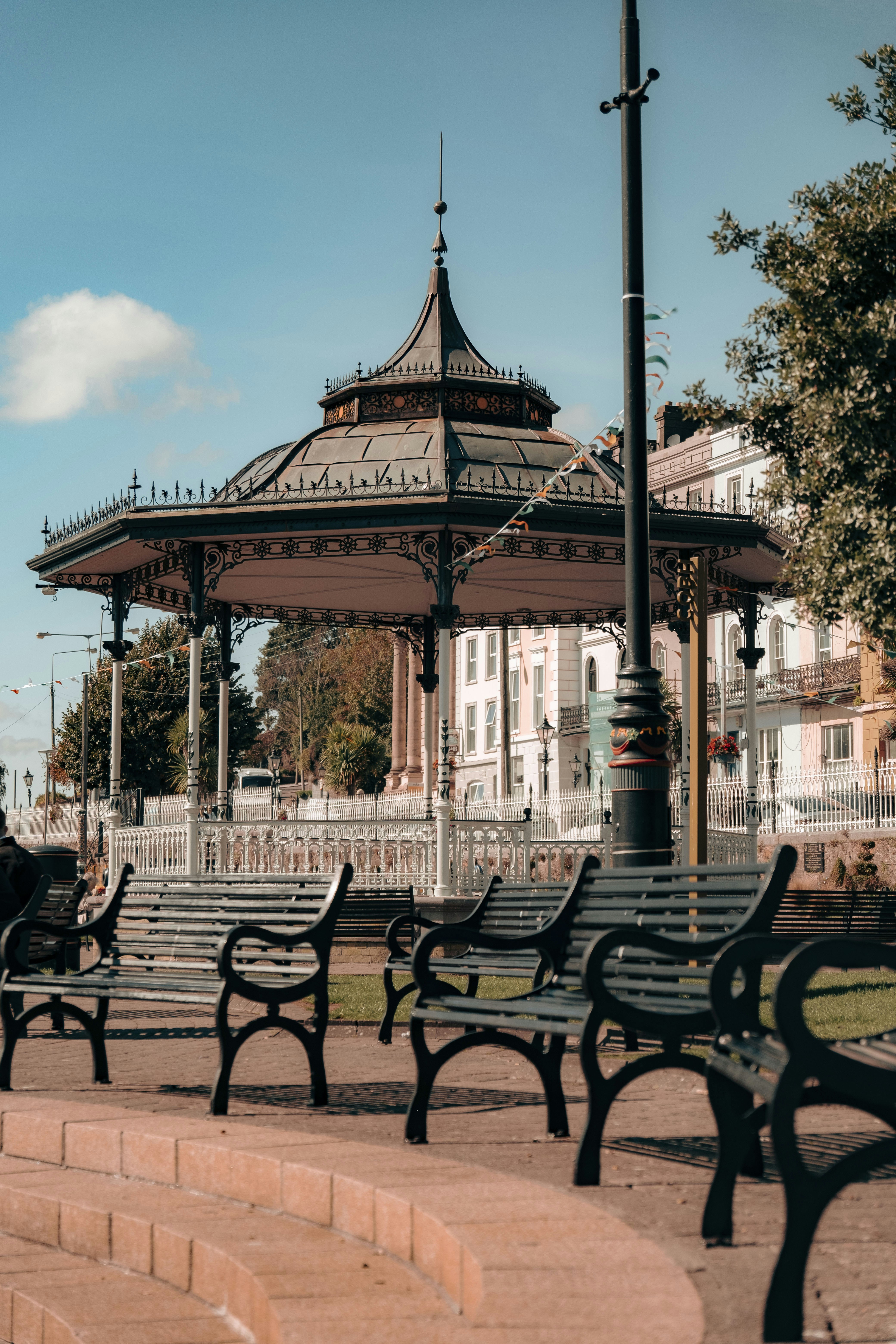 Ironwood Gazebo in Sunlit Park: A Quiet Urban Moment