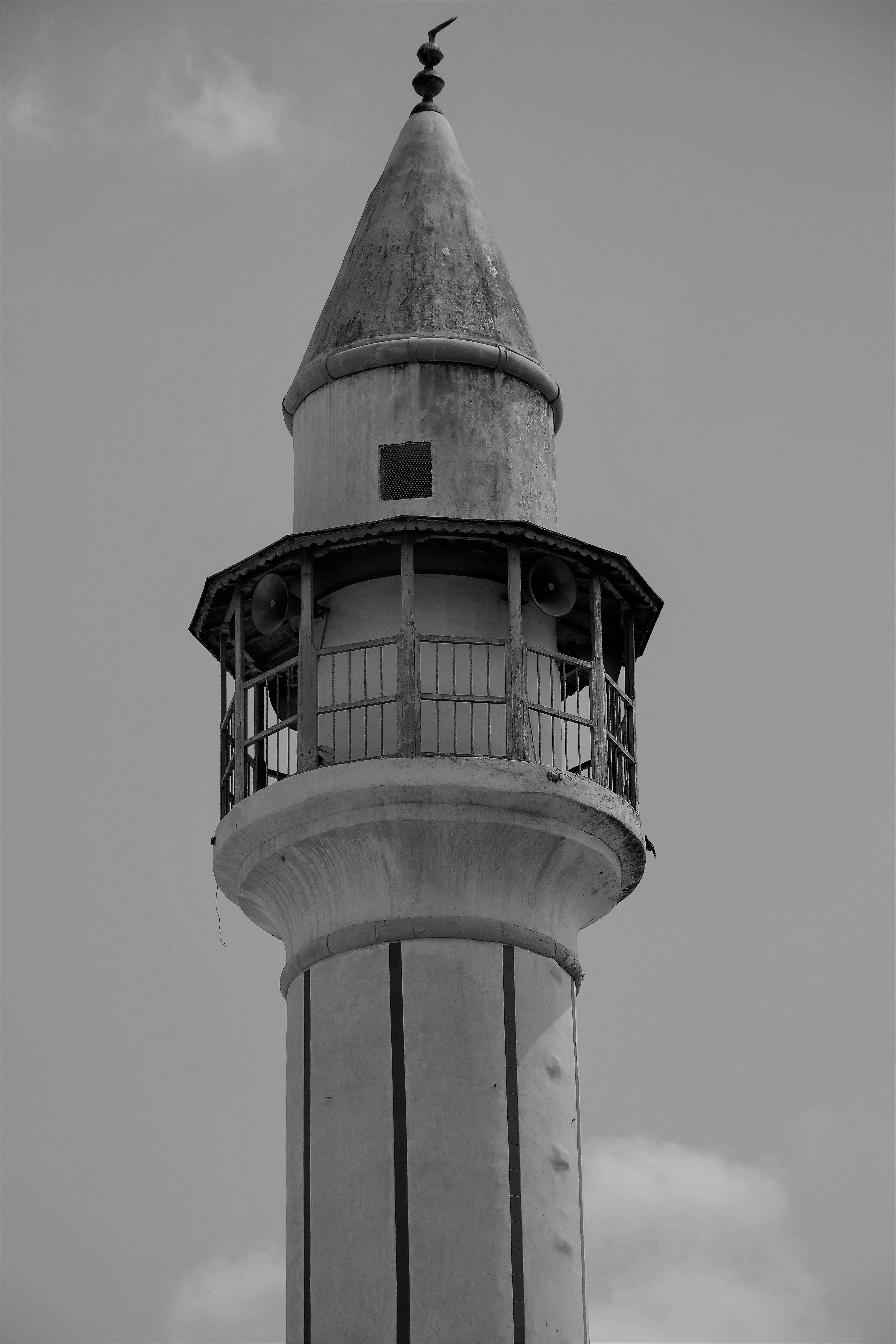 A Silent Beacon: The Weathered Turret against a Clear Sky