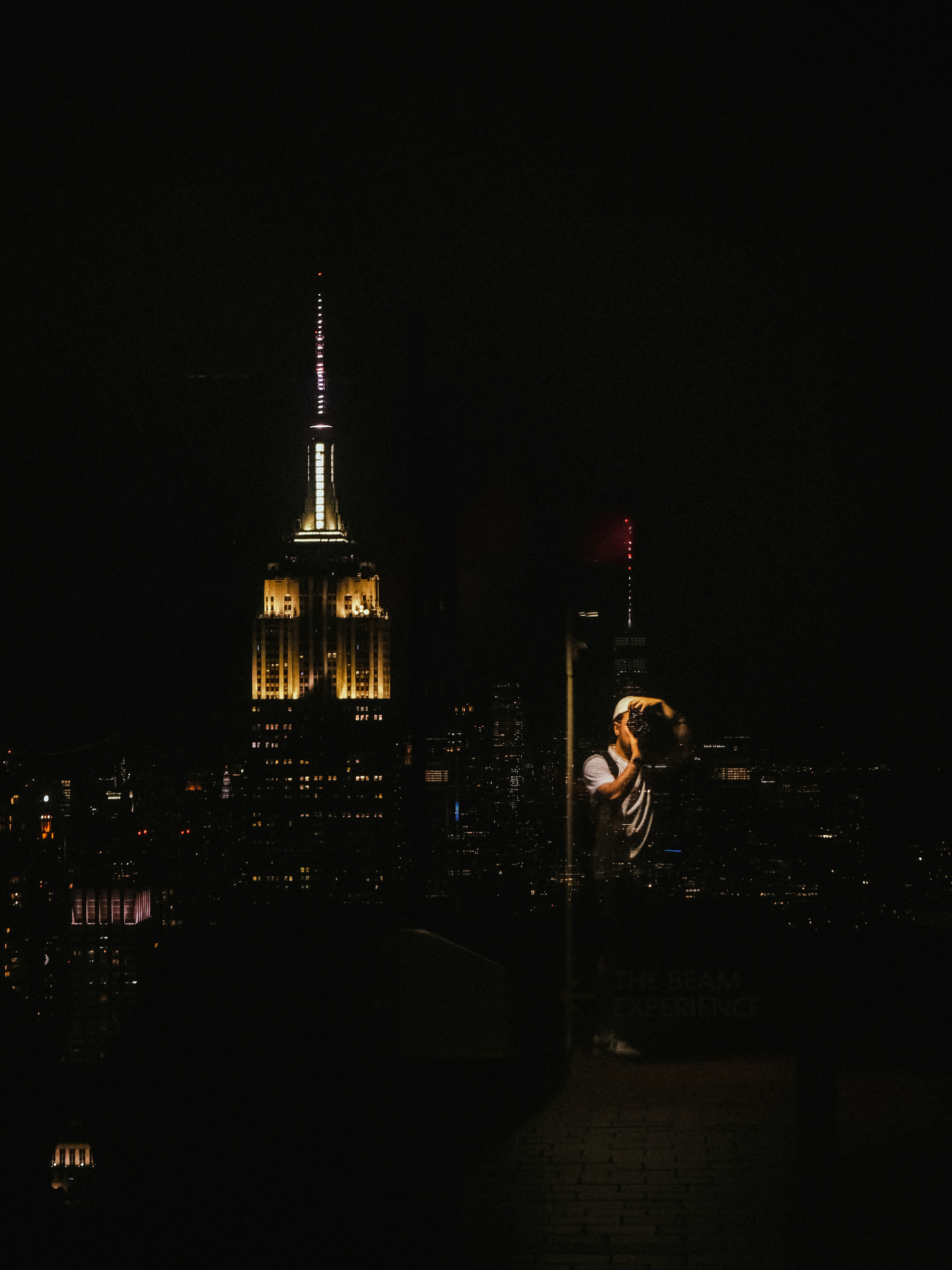 Nighttime NYC Silhouette with a Quiet Streetlight Embrace