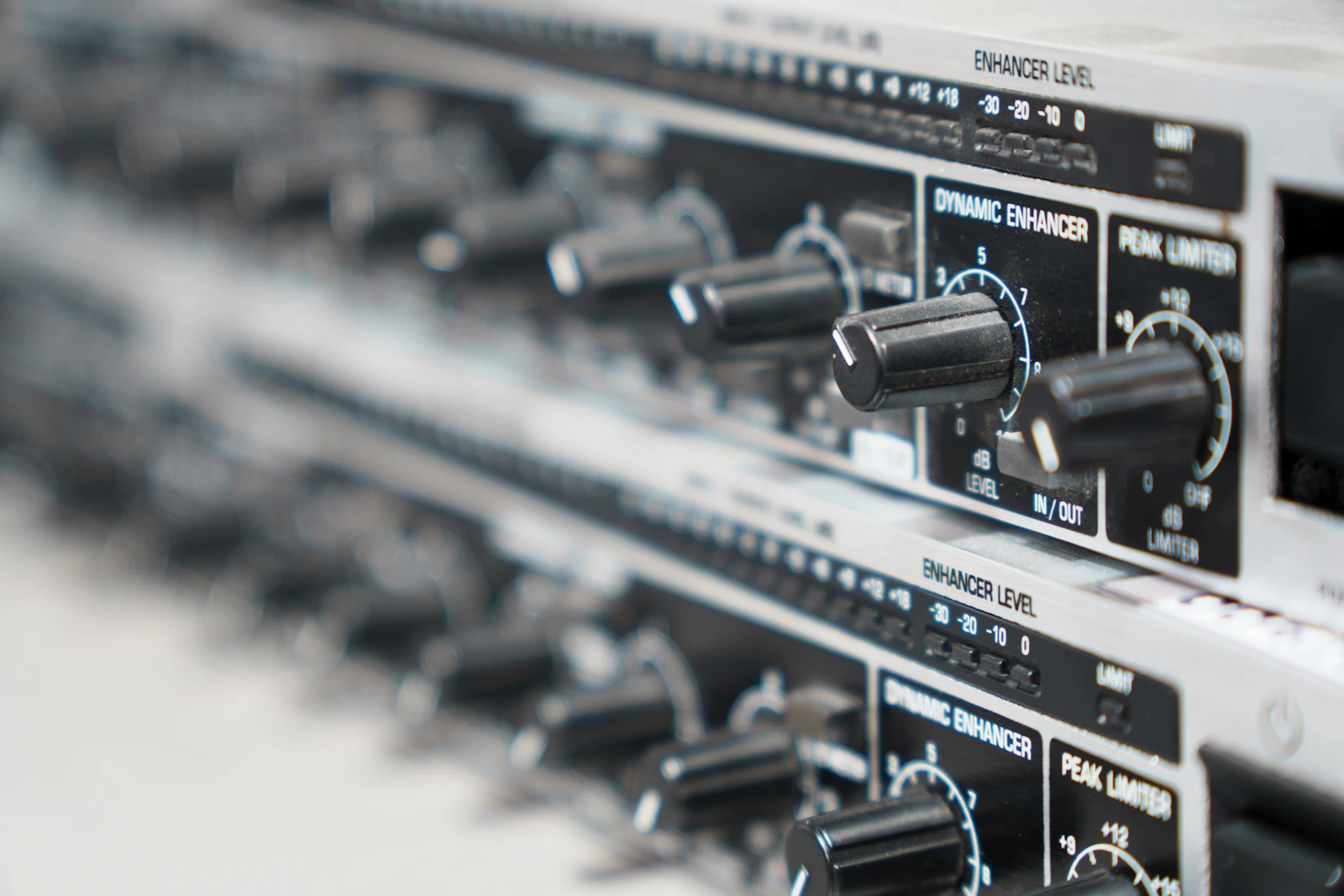 Vintage Rack of Equalization Knobs in Focus