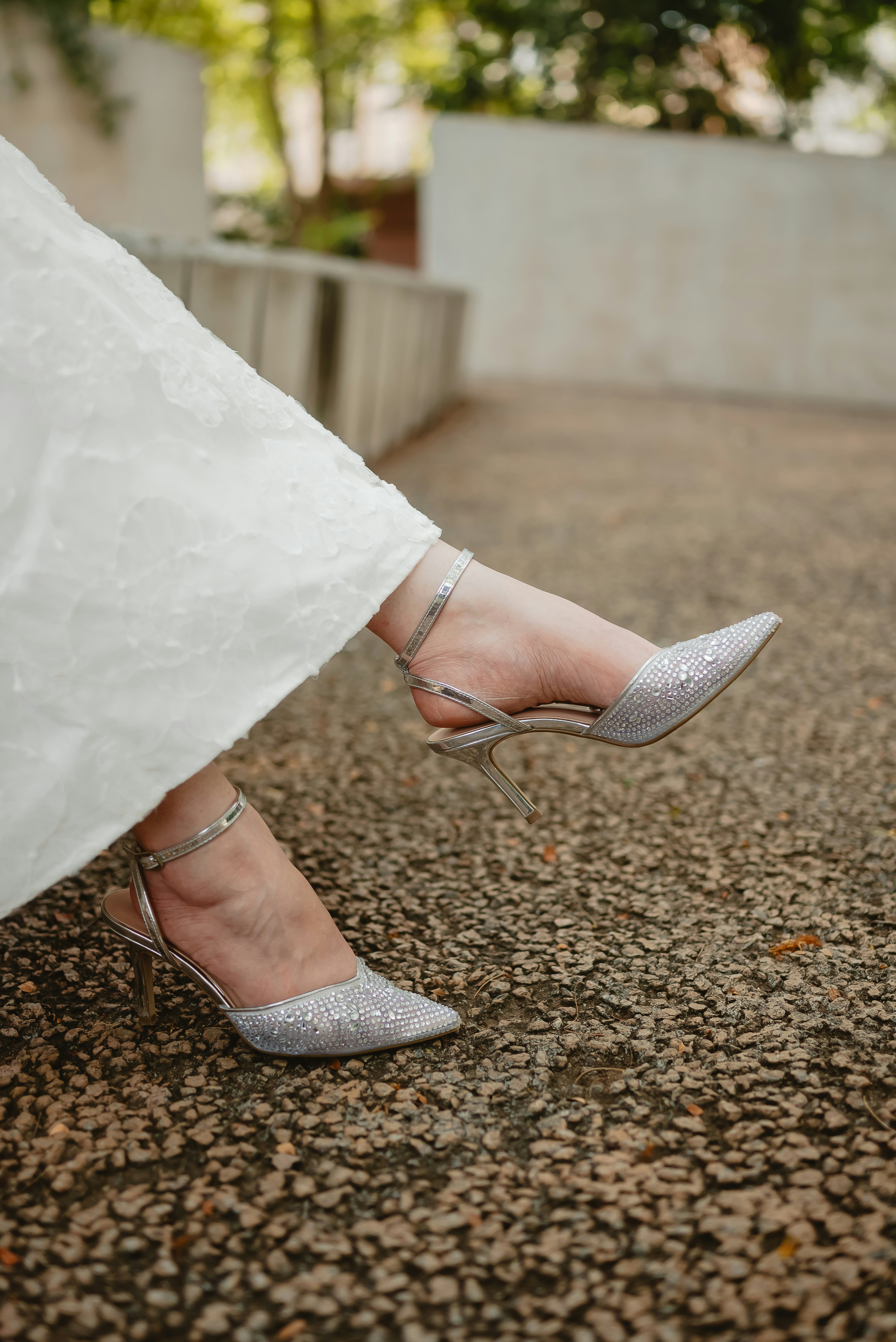 Silver Stride: Dancing Heels on a Pebble Path