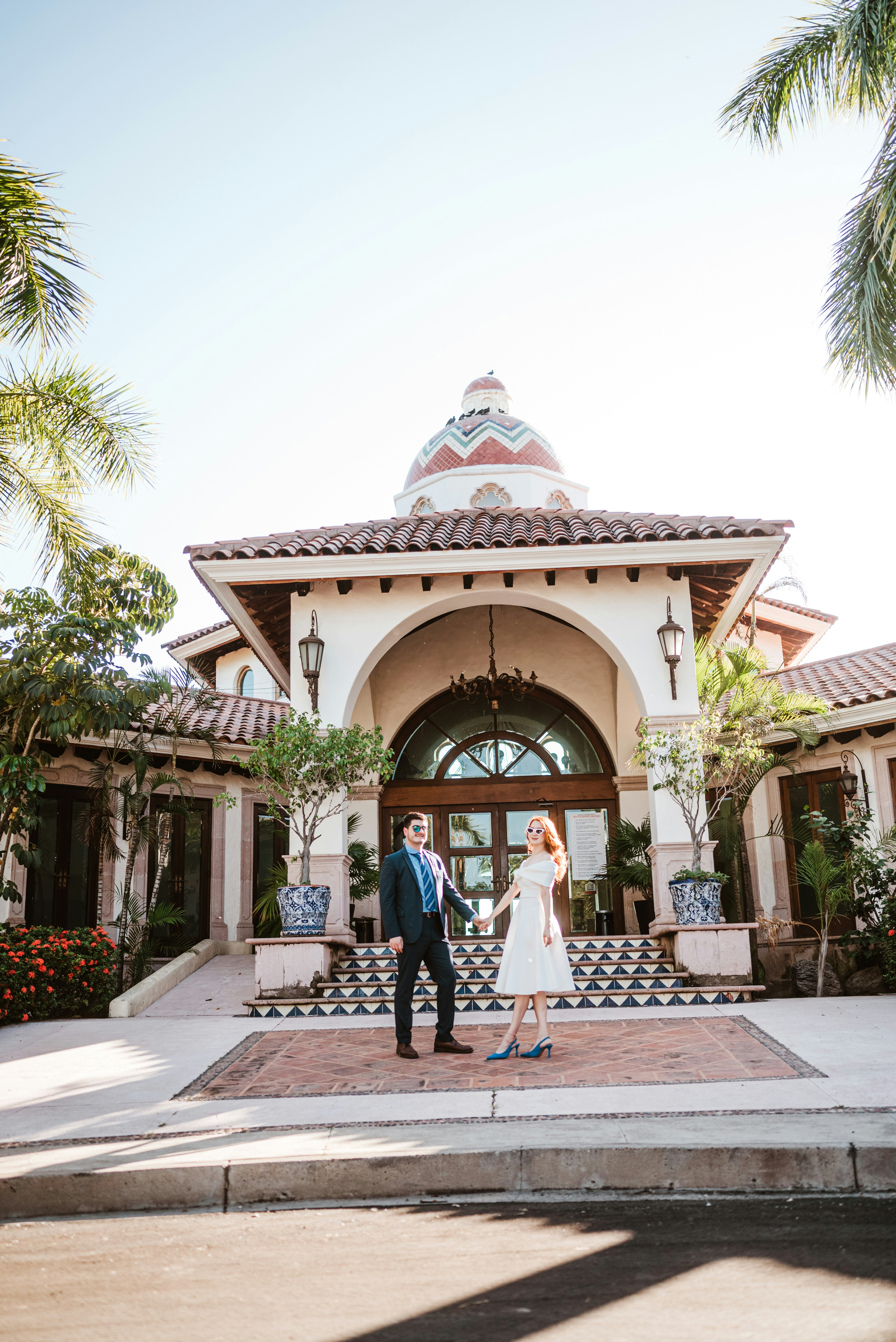 Charmed Entrance: A Couple Beneath the Basilica Arch