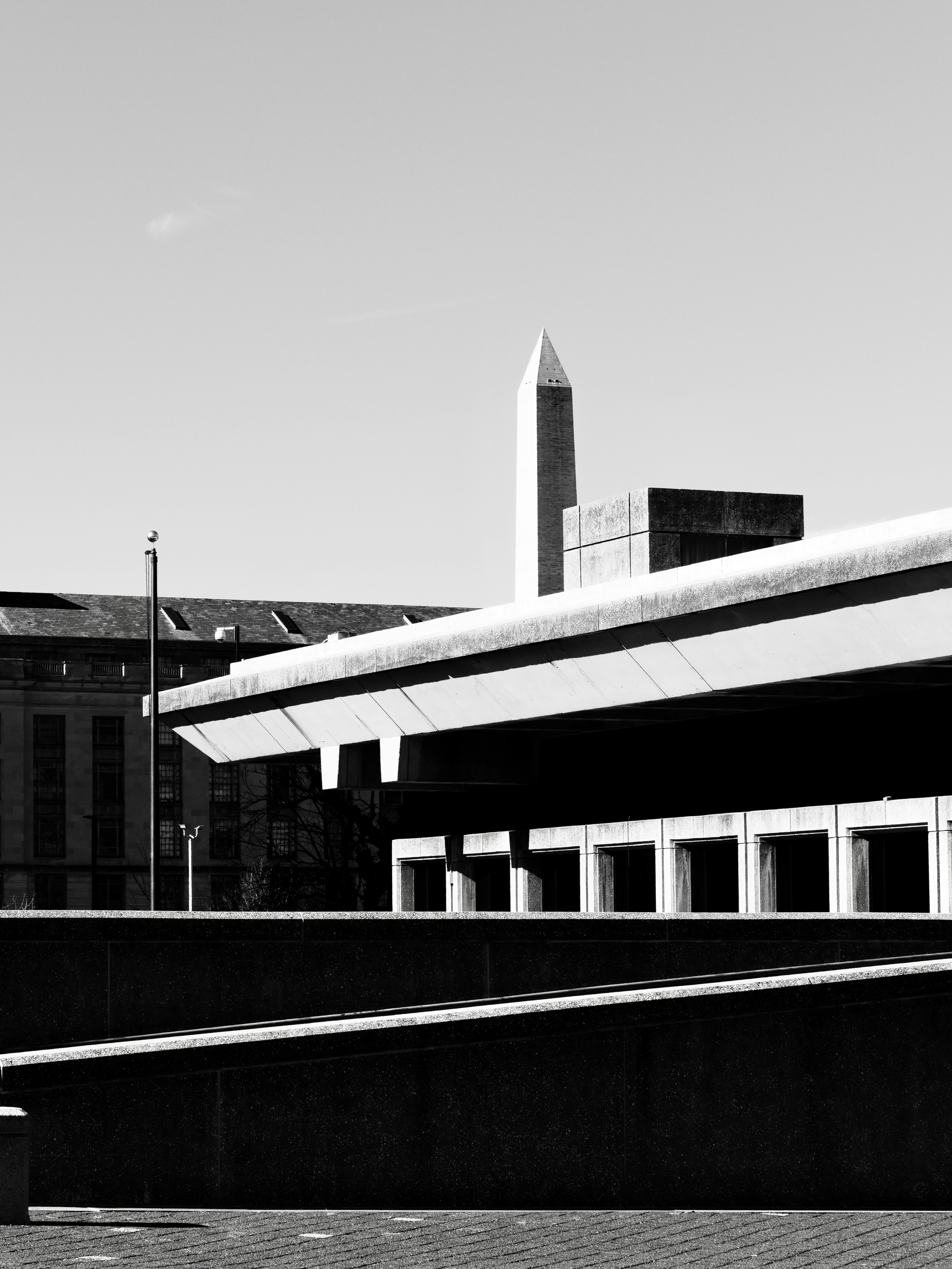 Monolithic Axis: A Modernist Roofline Toward the Sky