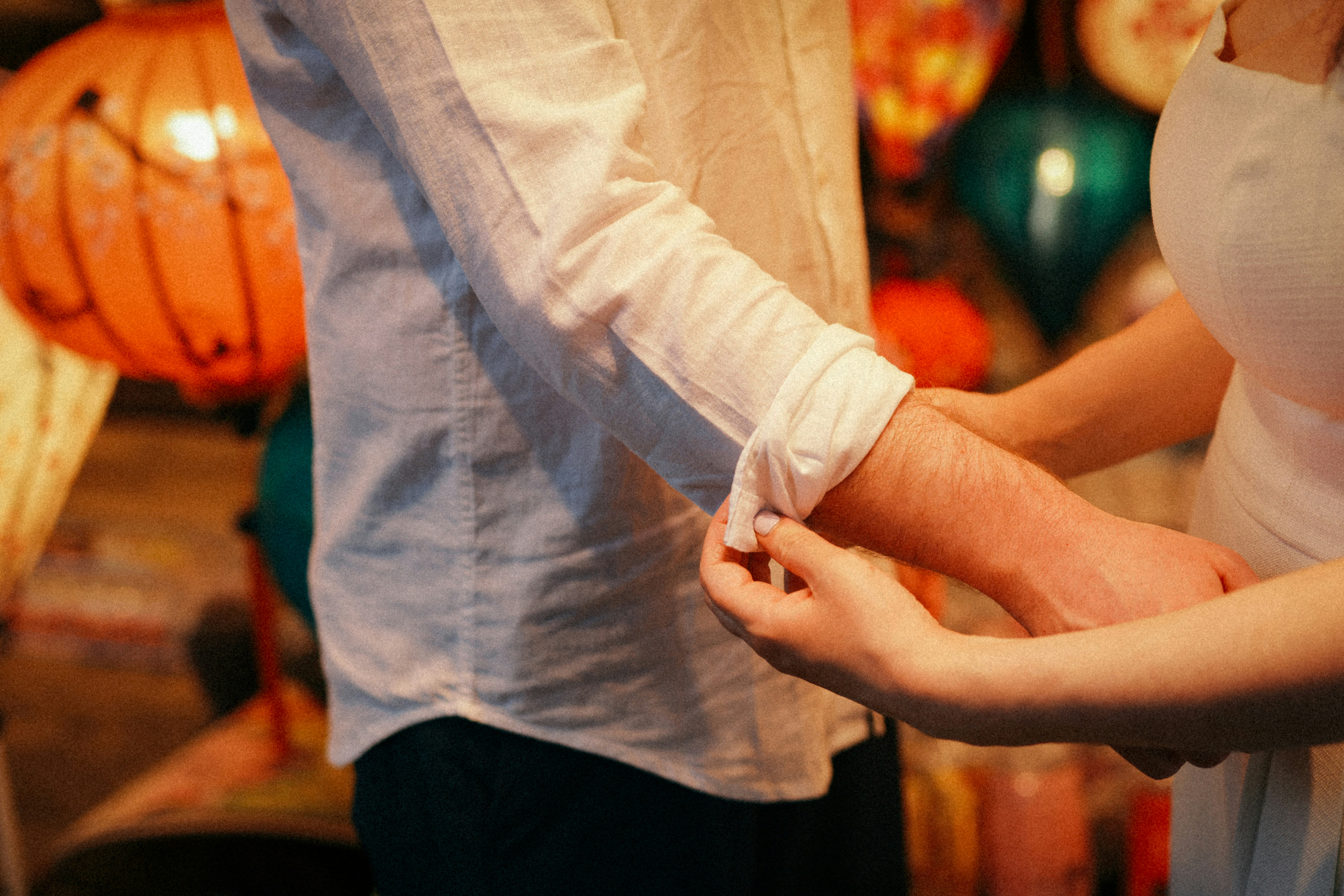 Hands in Motion at a Festive Gathering