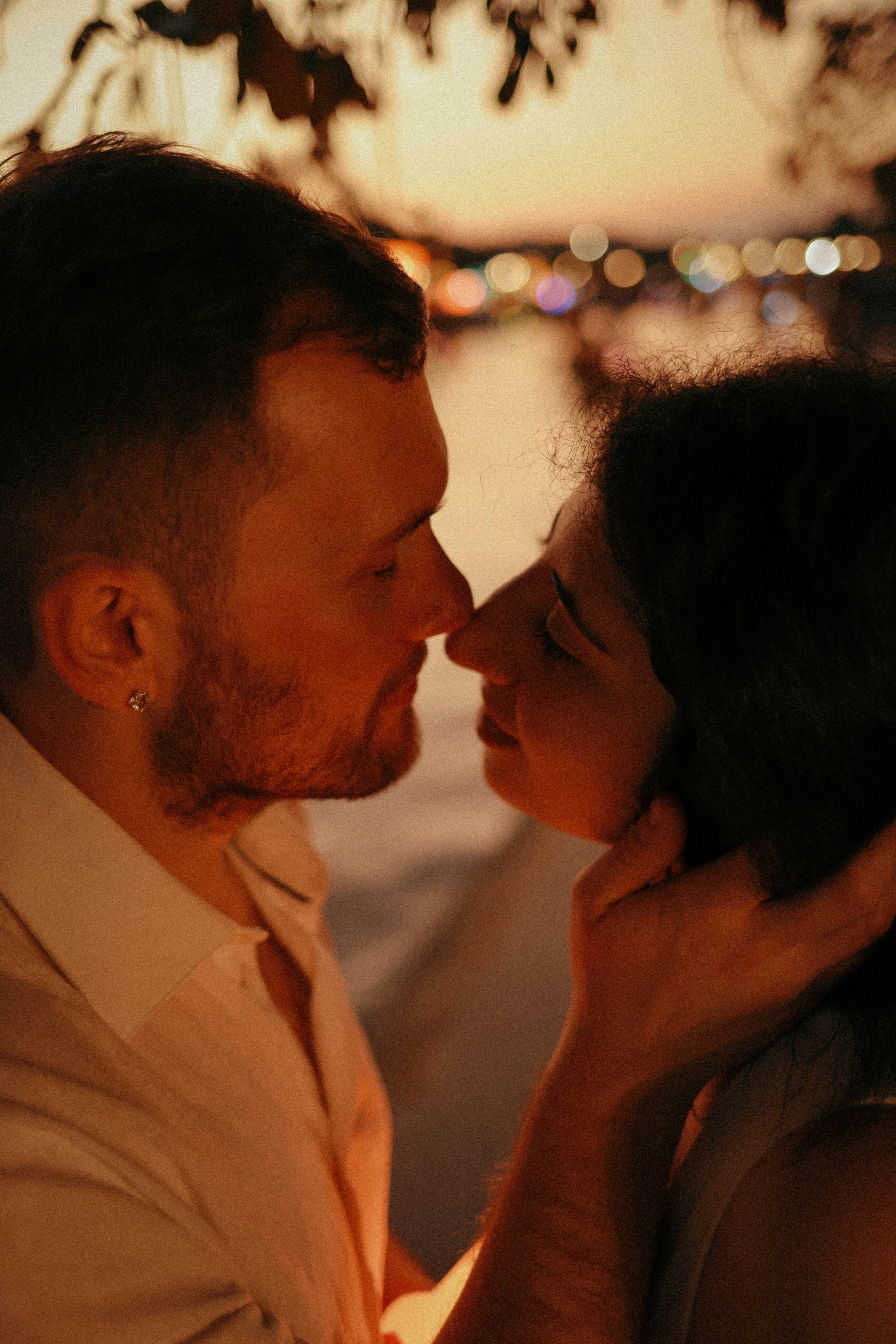 Close-Contact Sunset: A Gentle Kiss by the Water