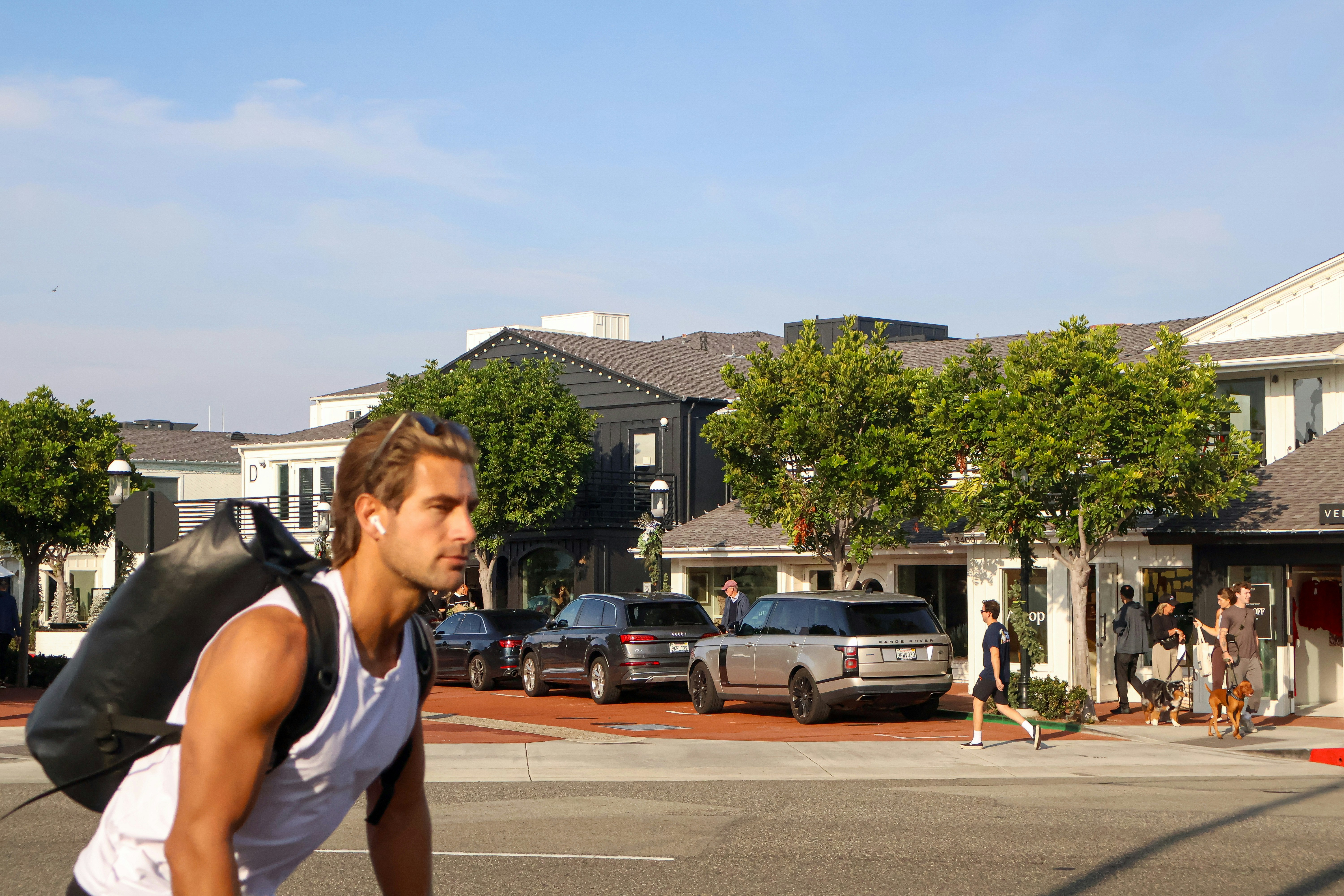 Marathon Moment: The Runner Faces the Street Between Shops