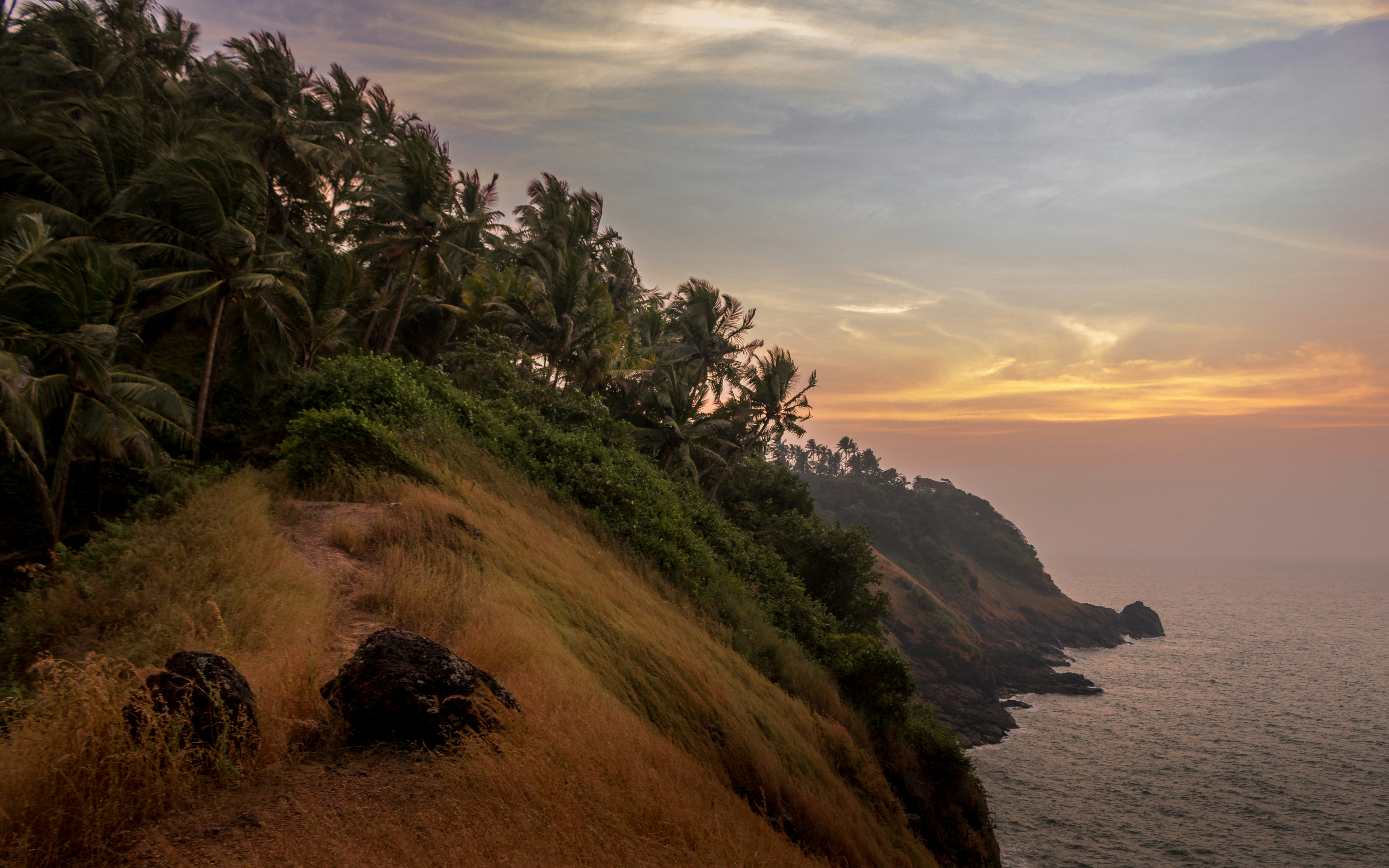 Golden Cliffs at Dusk: A Silent Ocean Edge