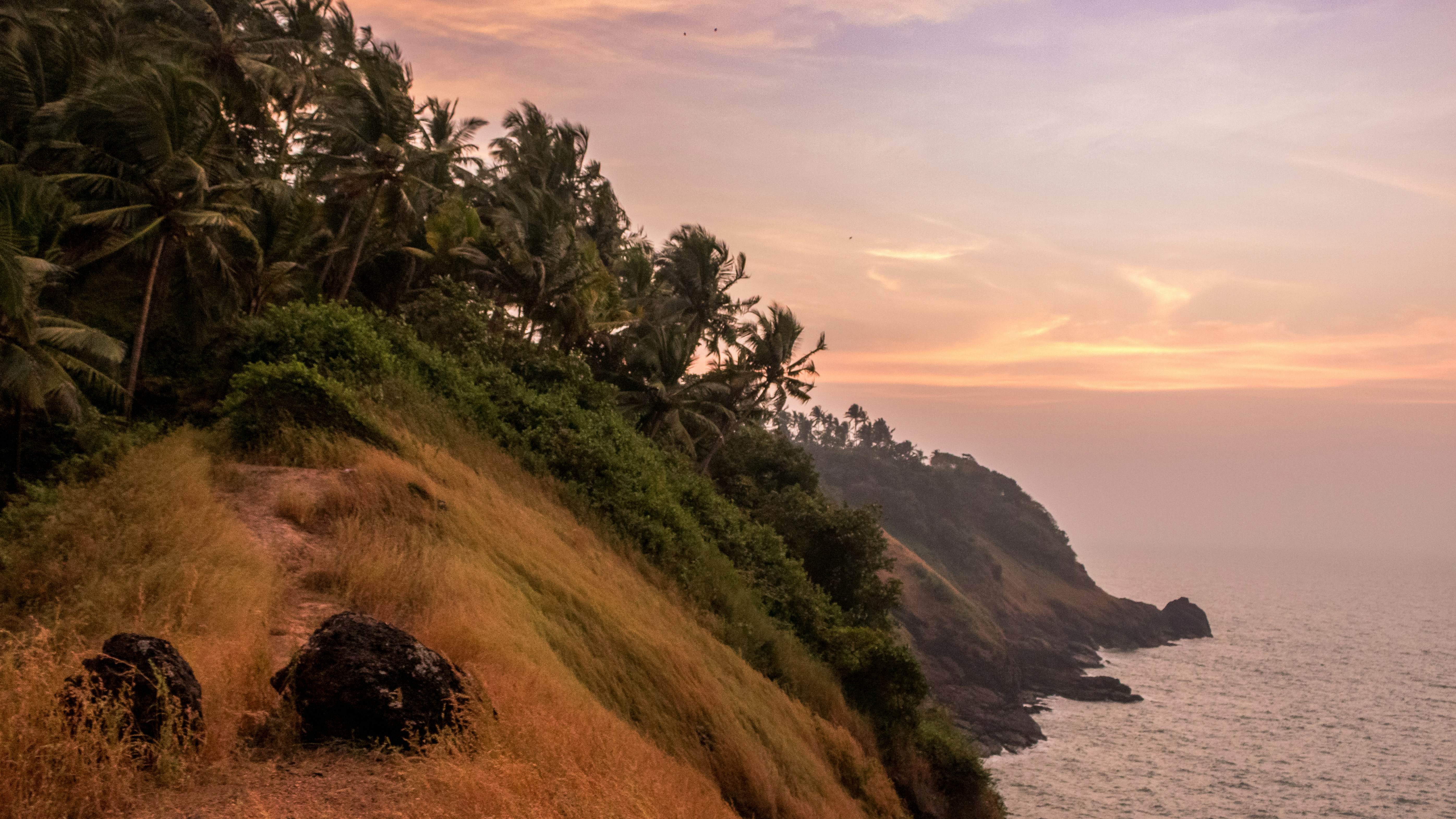 Sunset Over a Cliff Coast