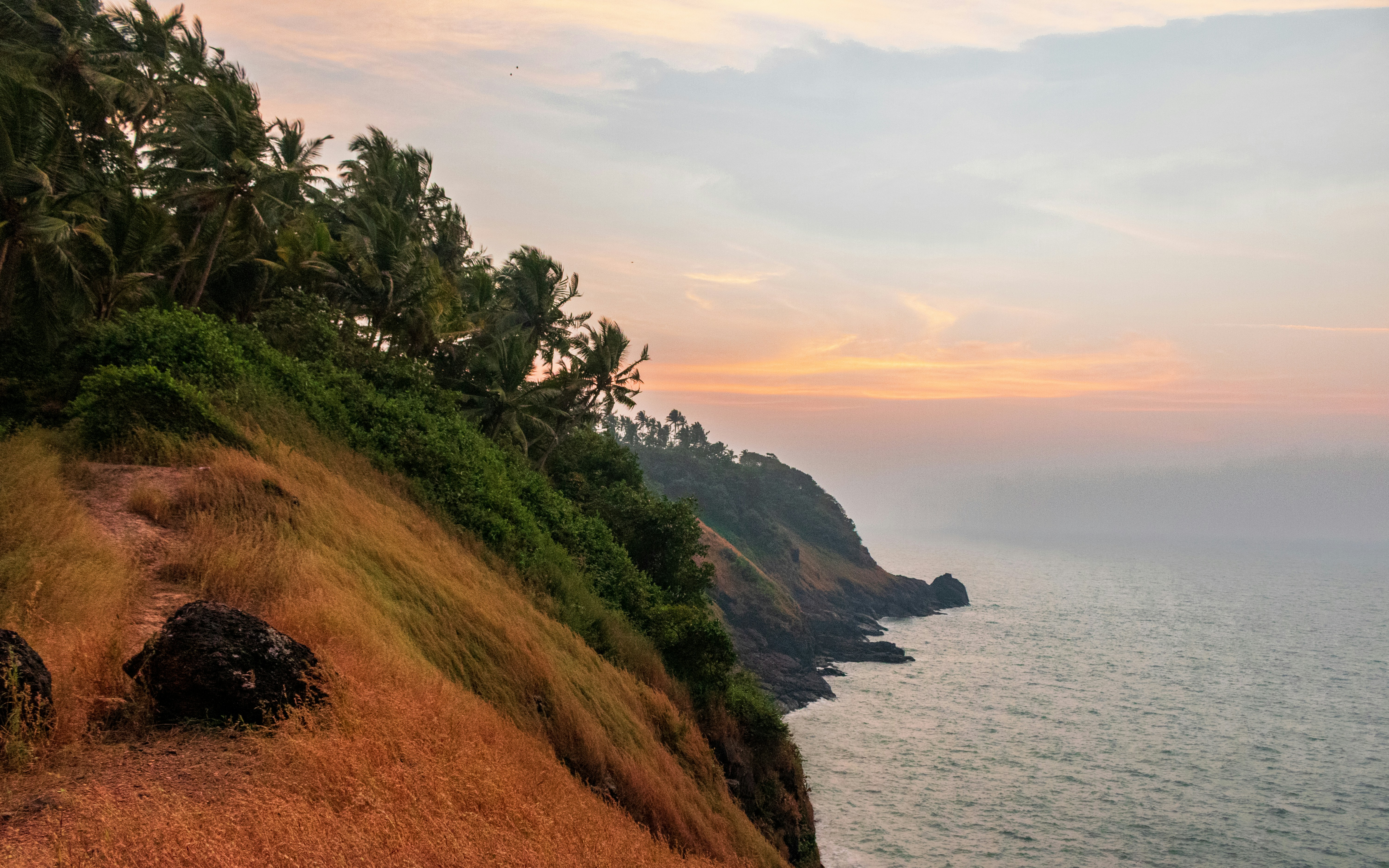 Coastal Cliffs at Sunset: A Quiet Verge Between Sea and Sky