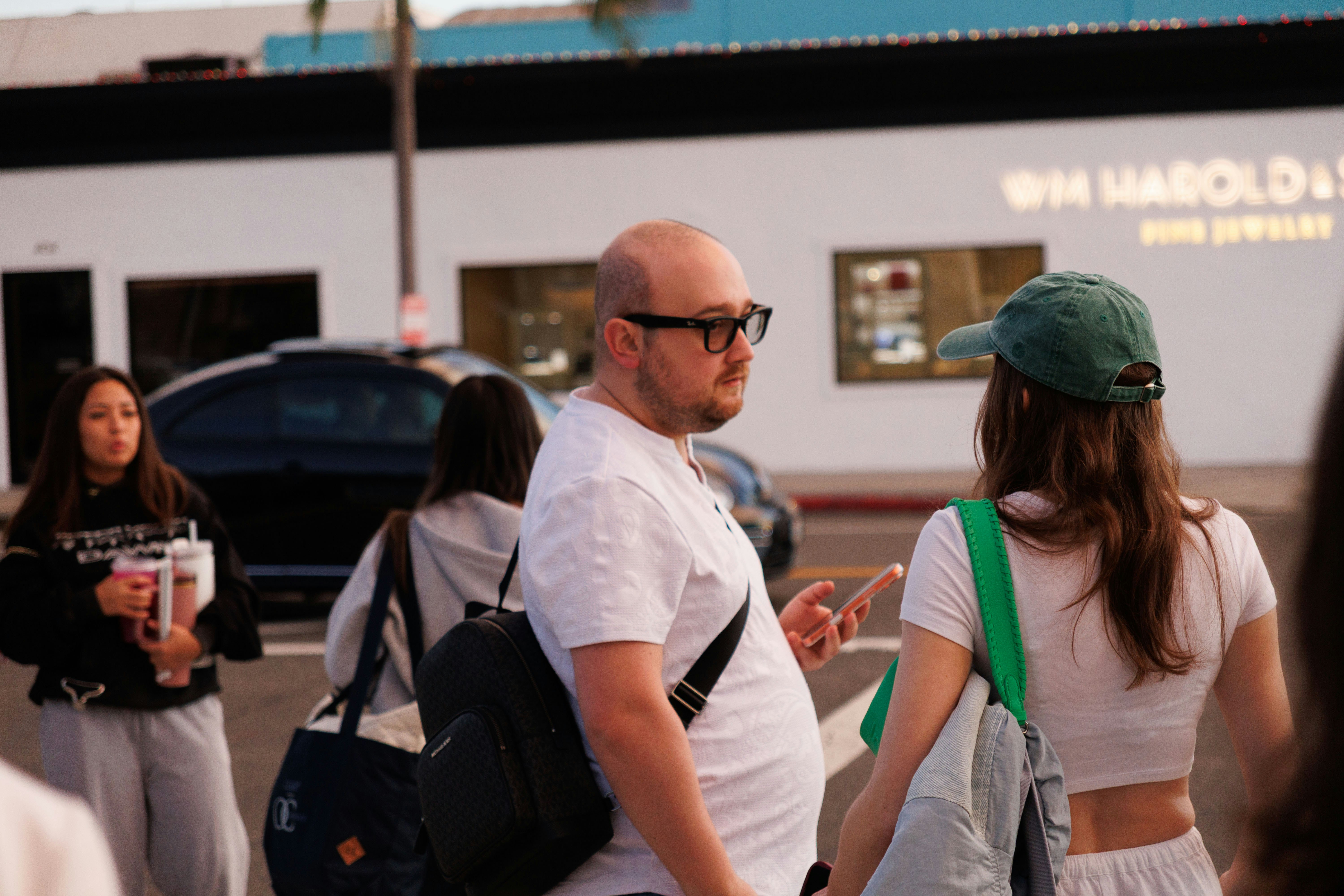 Crossroads of Conversation on a Sunlit Street