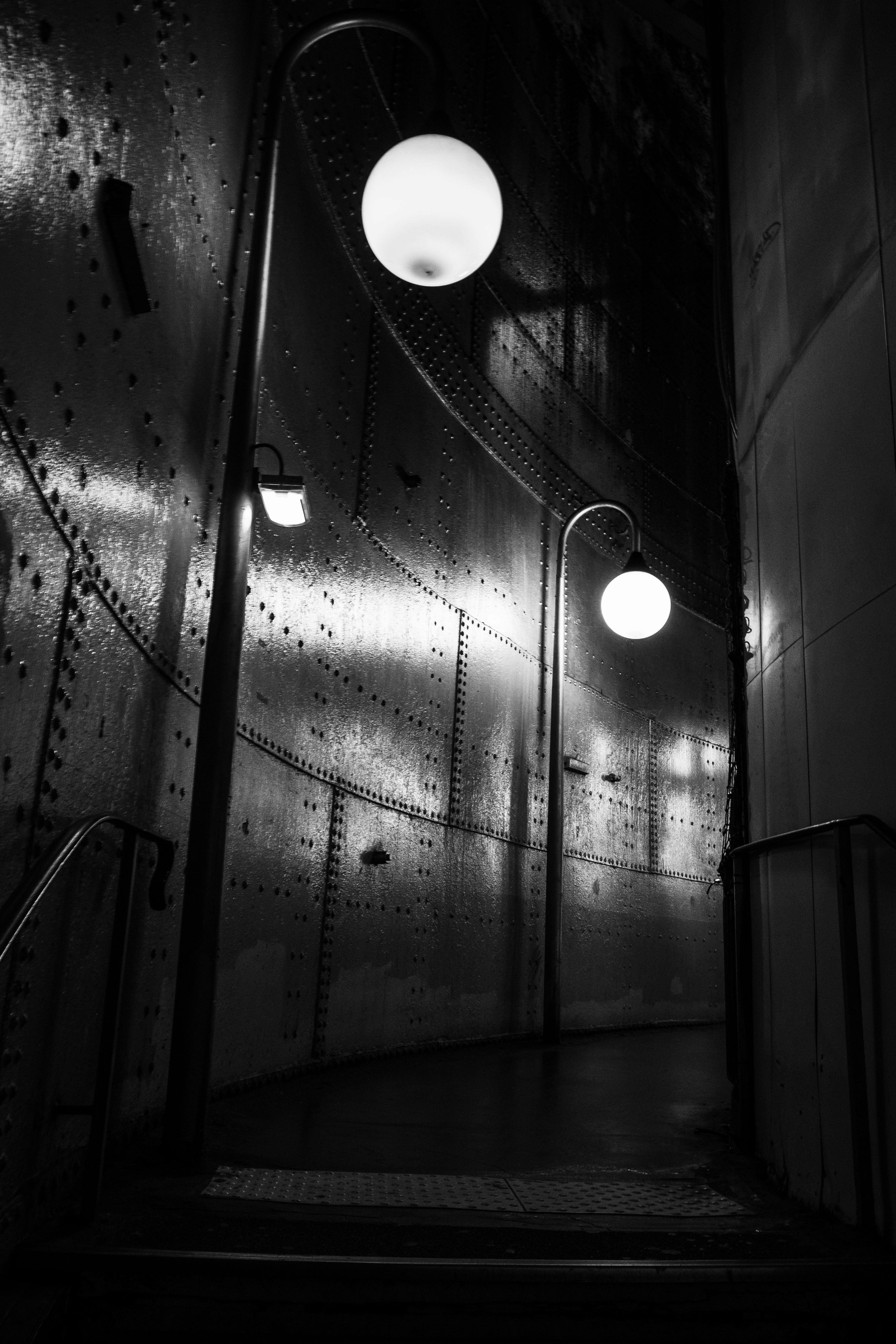 Glowing Spheres in an Industrial Corridor