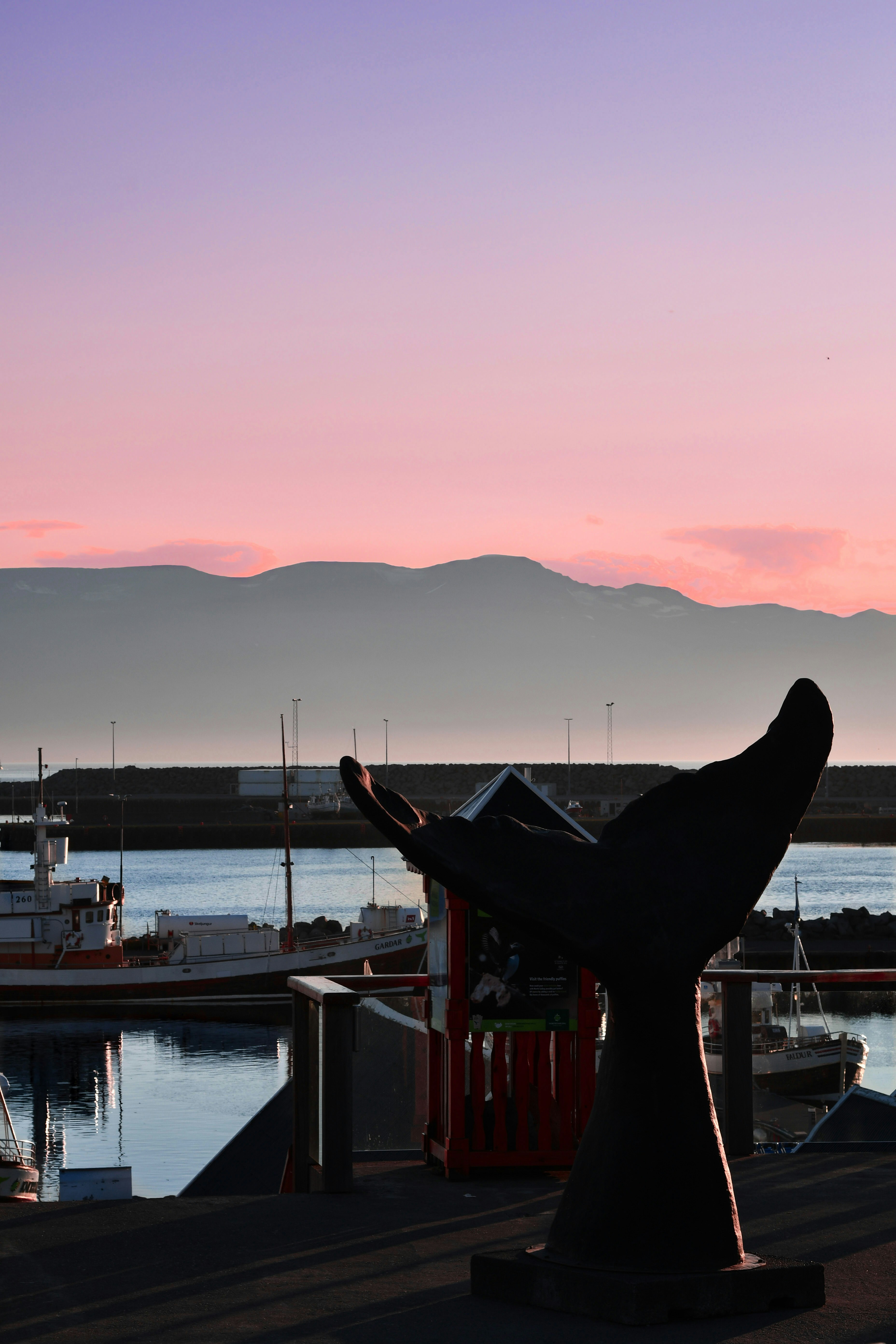 Harbor Sculpture at Dusk: A Silhouette Against Painted Quiet