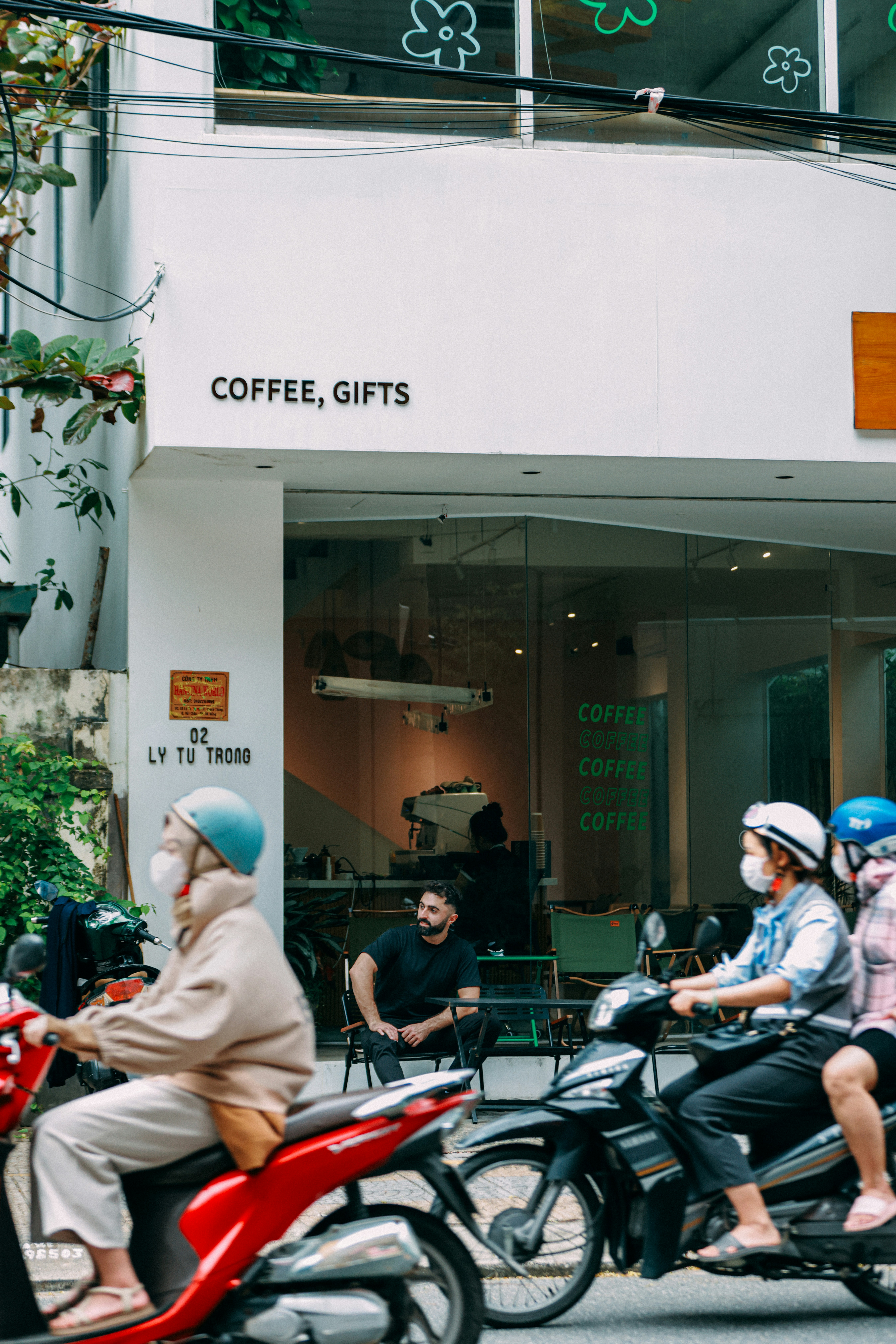 Cafe Street Pulse: Motorbikes, Masks, and Morning Light