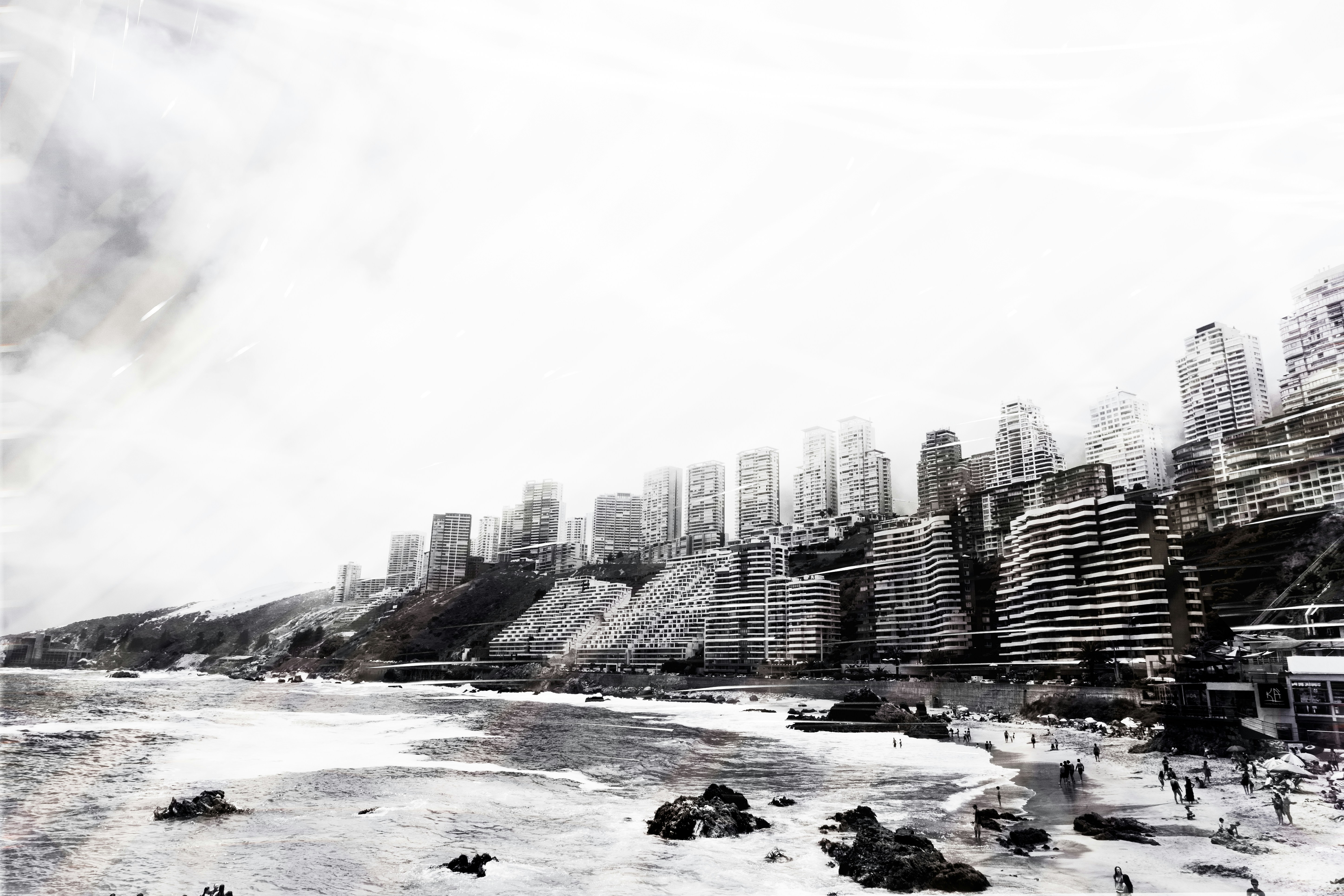Coastal City Silhouette Beneath Stormy Skies