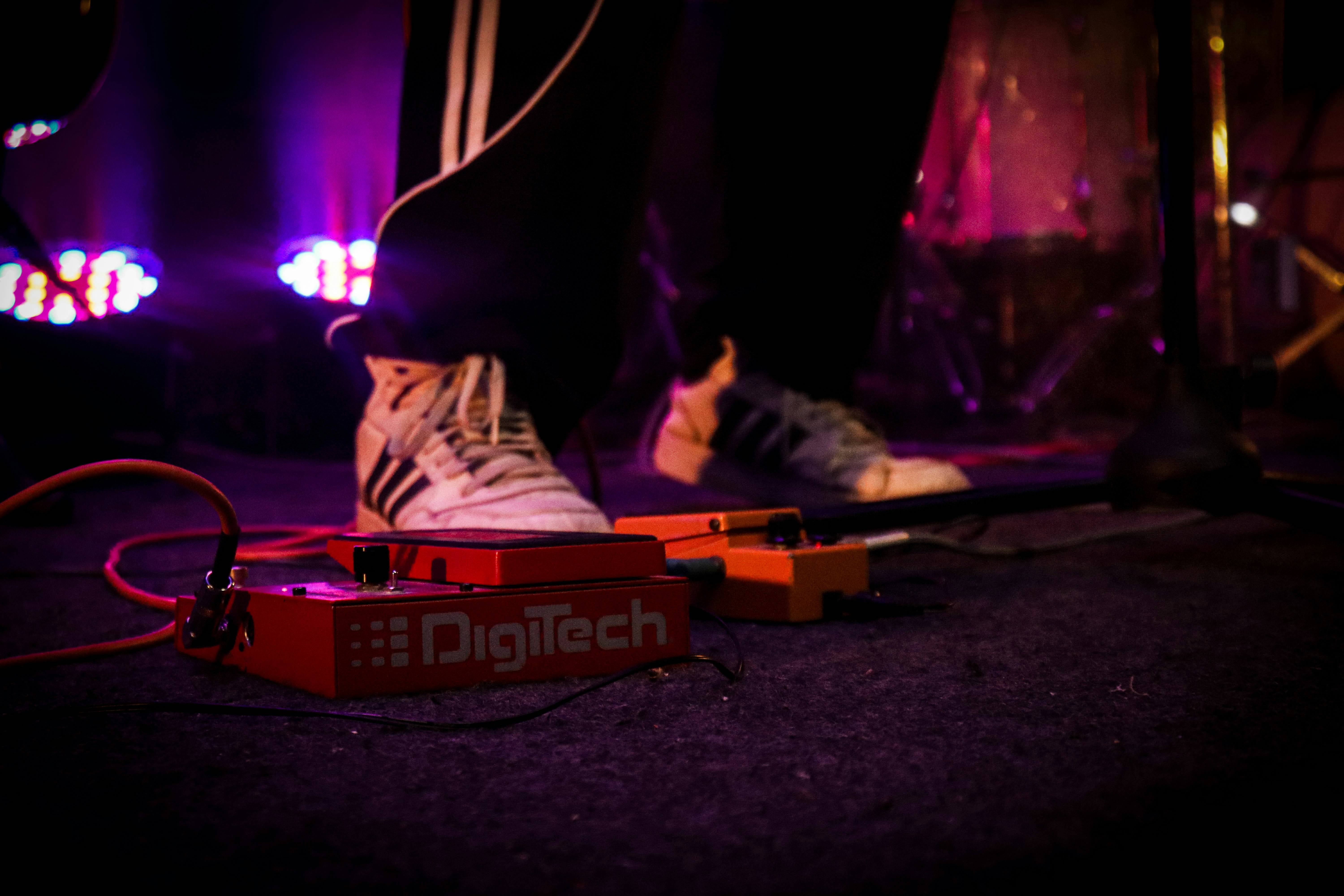Foot pedals in the spotlight: a guitarist's stage close-up