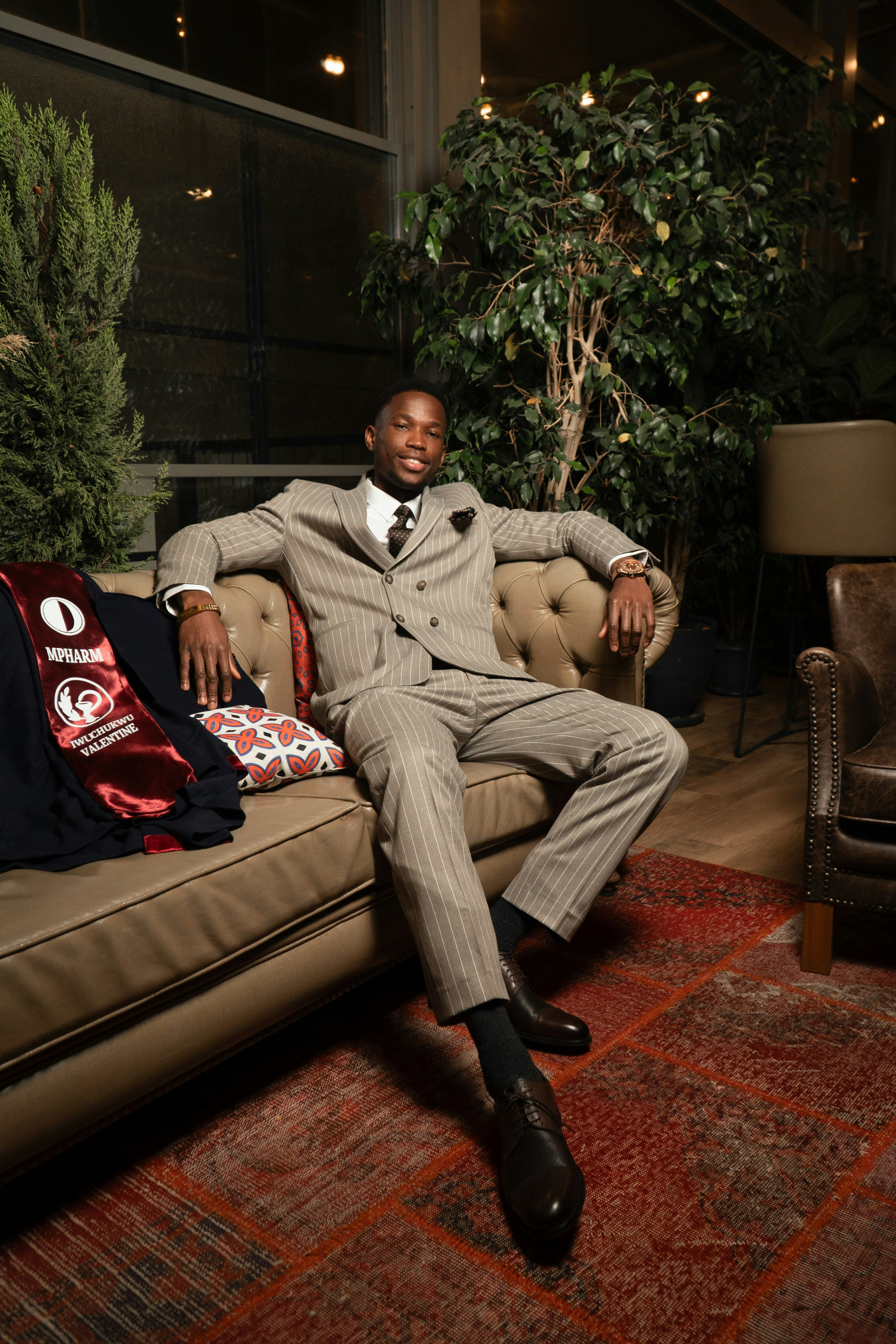 Midcentury Confidence: A Dapper Moment on the Sofas