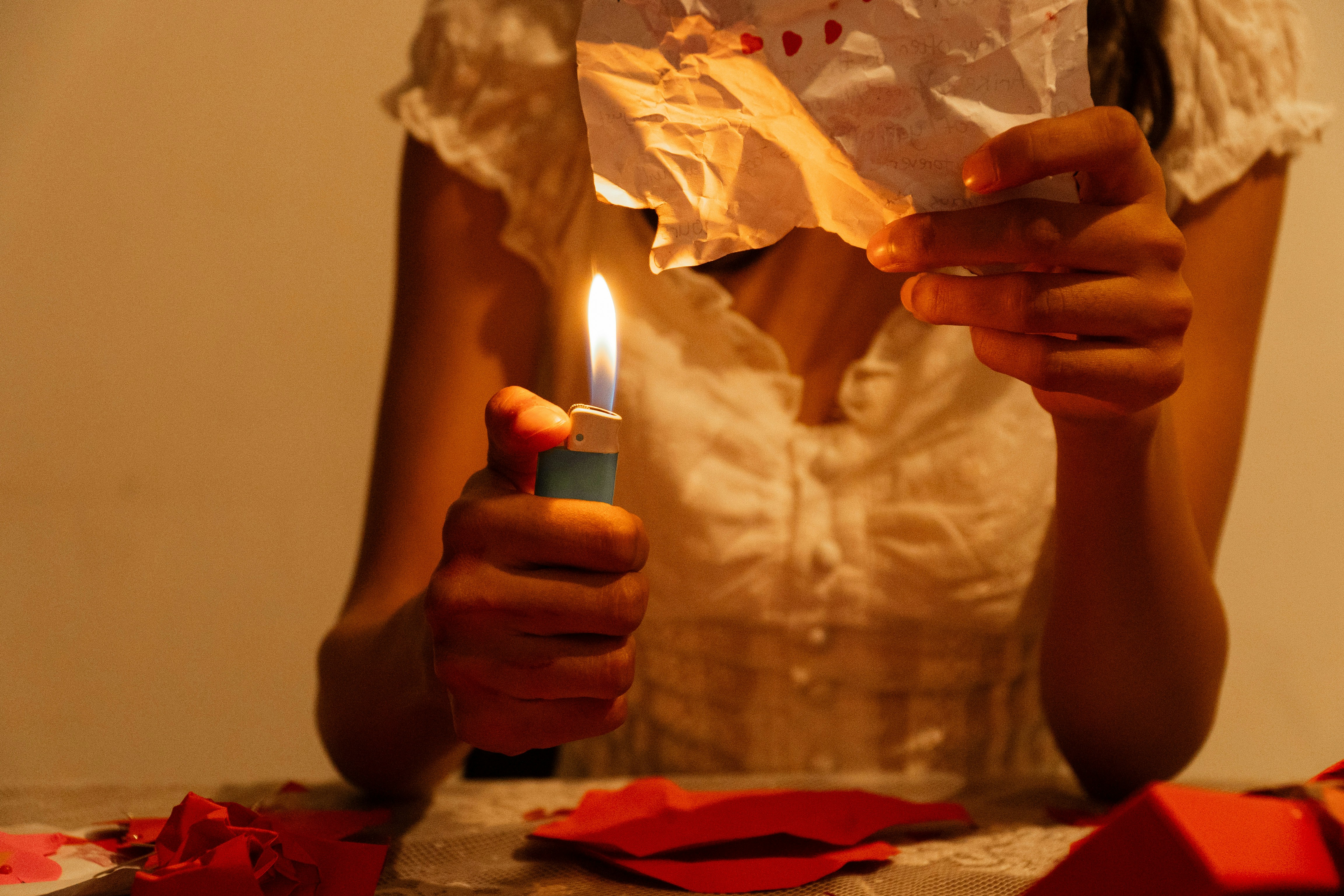 Flame and Paper: A Quiet Moment of Card Cutouts