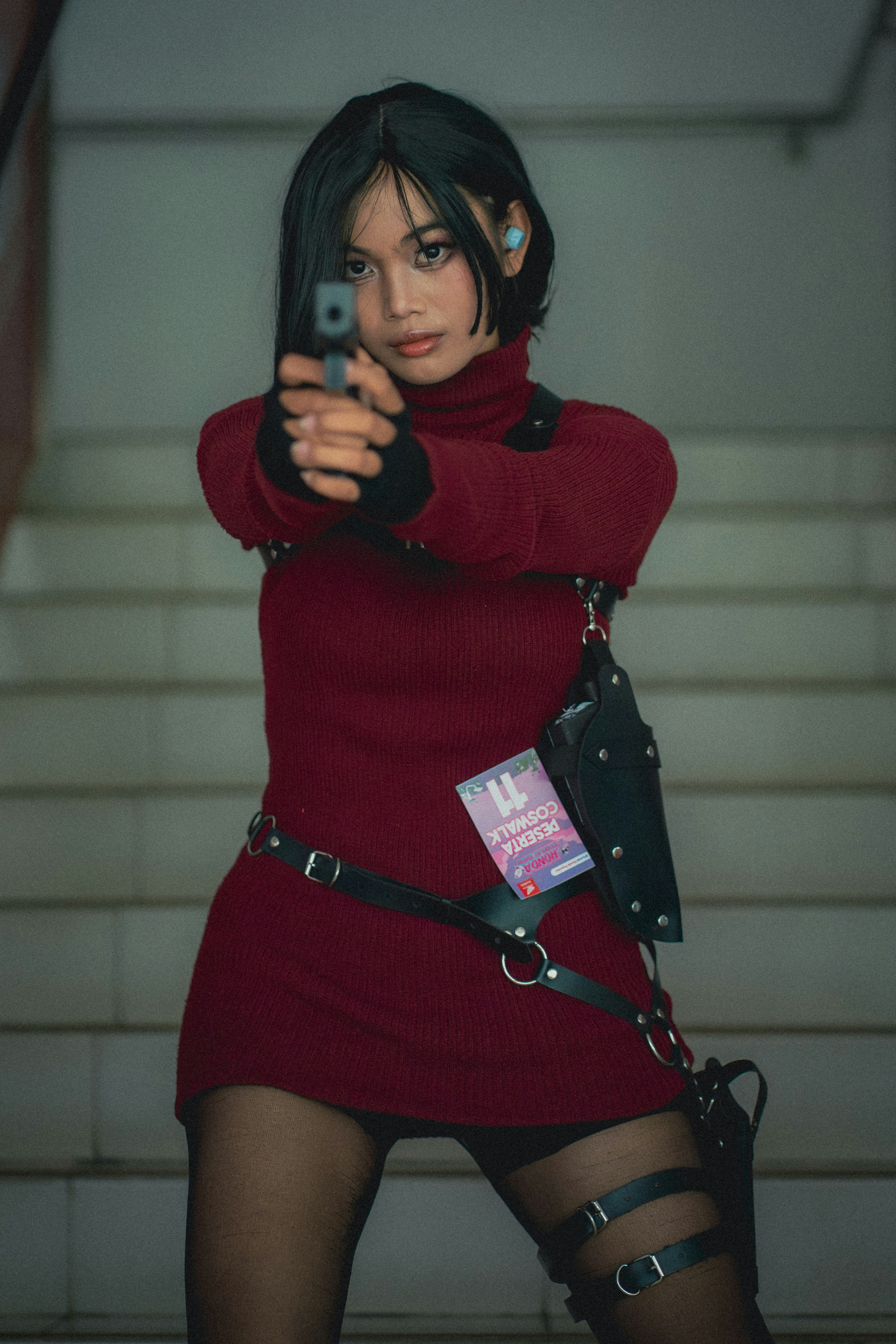 Gunsight Gaze: Red Knit and Shadowed Steps