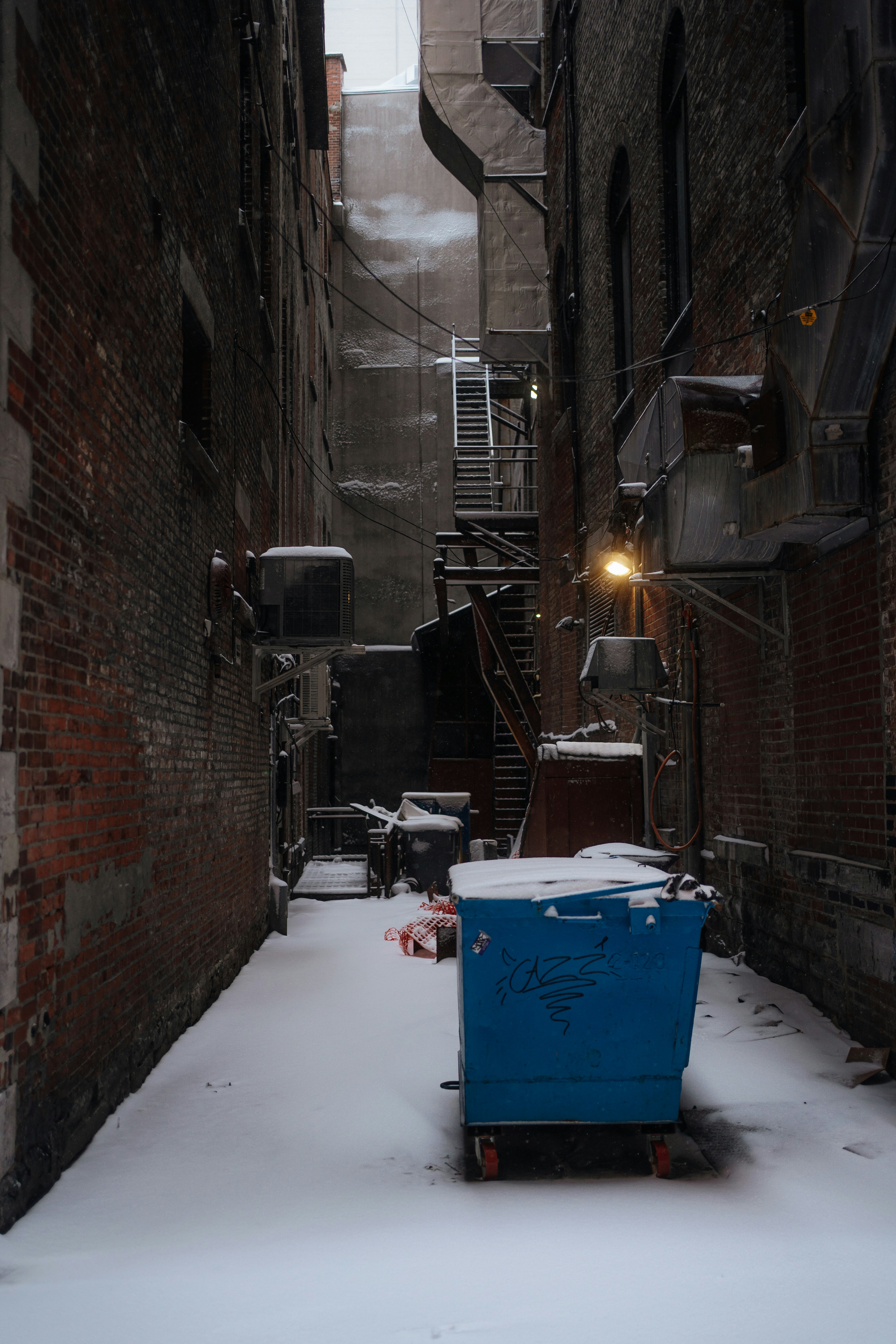 Snow-Laced Alleyway Beneath Hidden Runway Lights