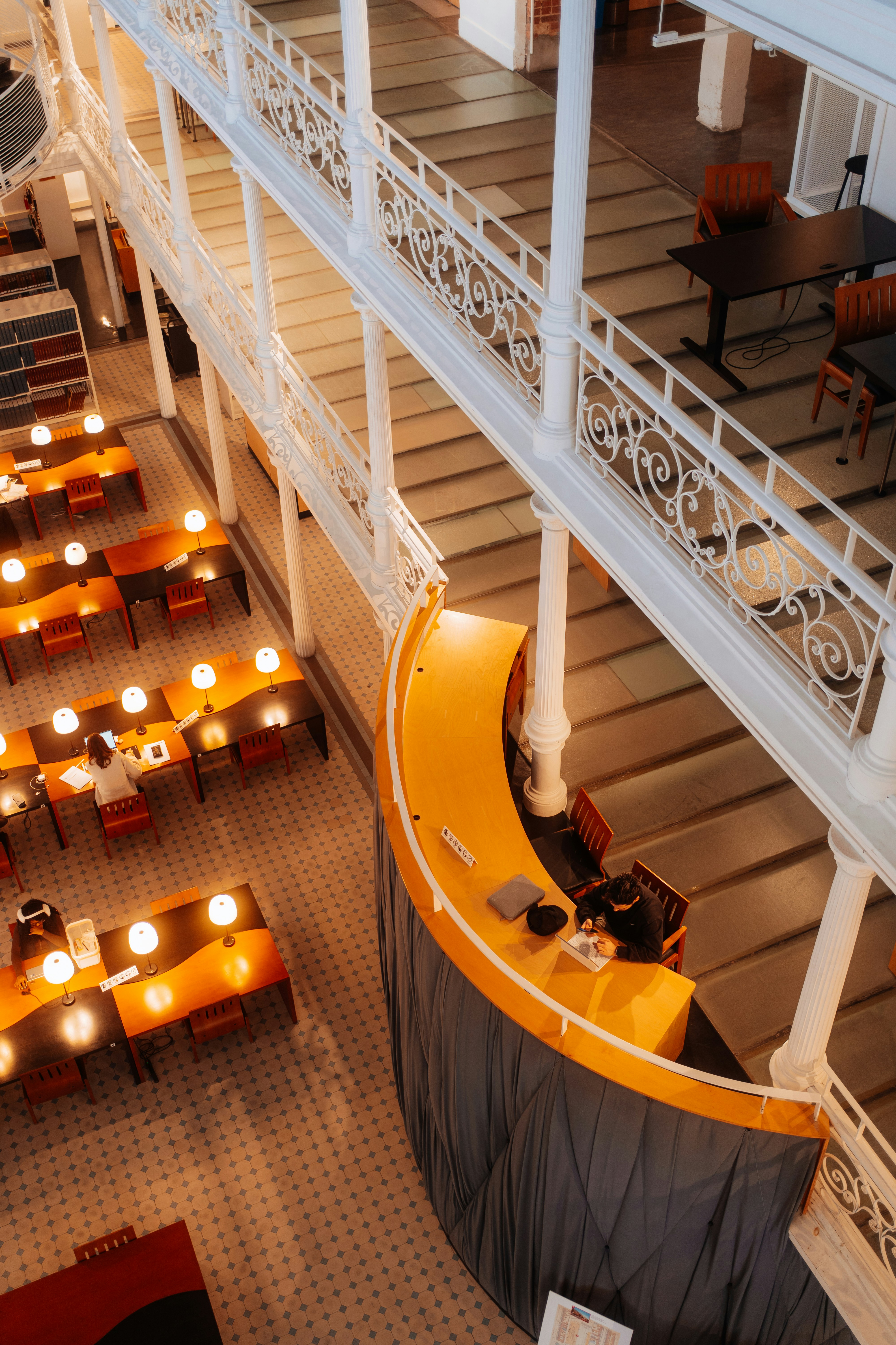 Balcony of Light: A Stairwell Café Emerges from the Ornate Gallery