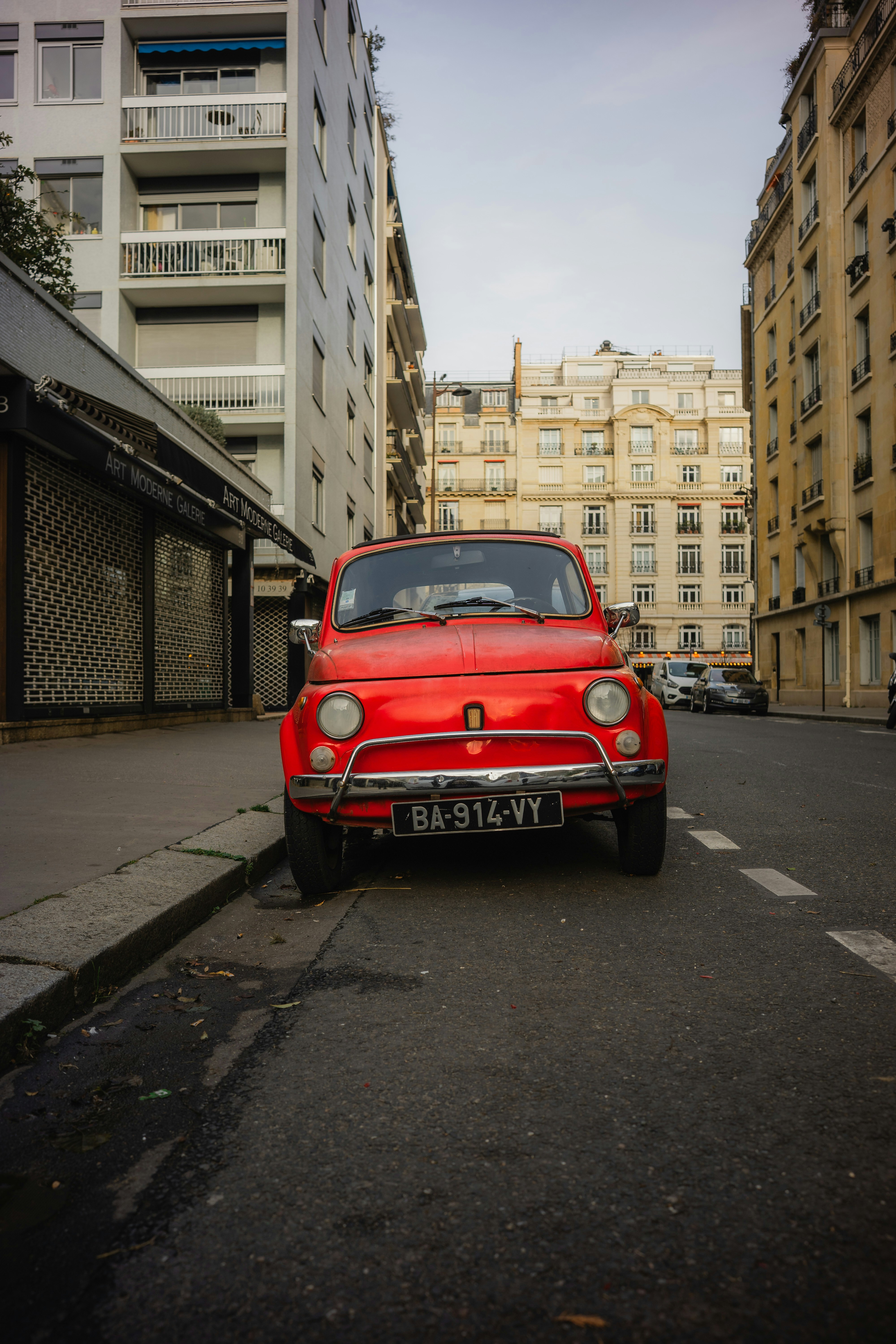Red Citroën at the End of a Quiet Parisian Street