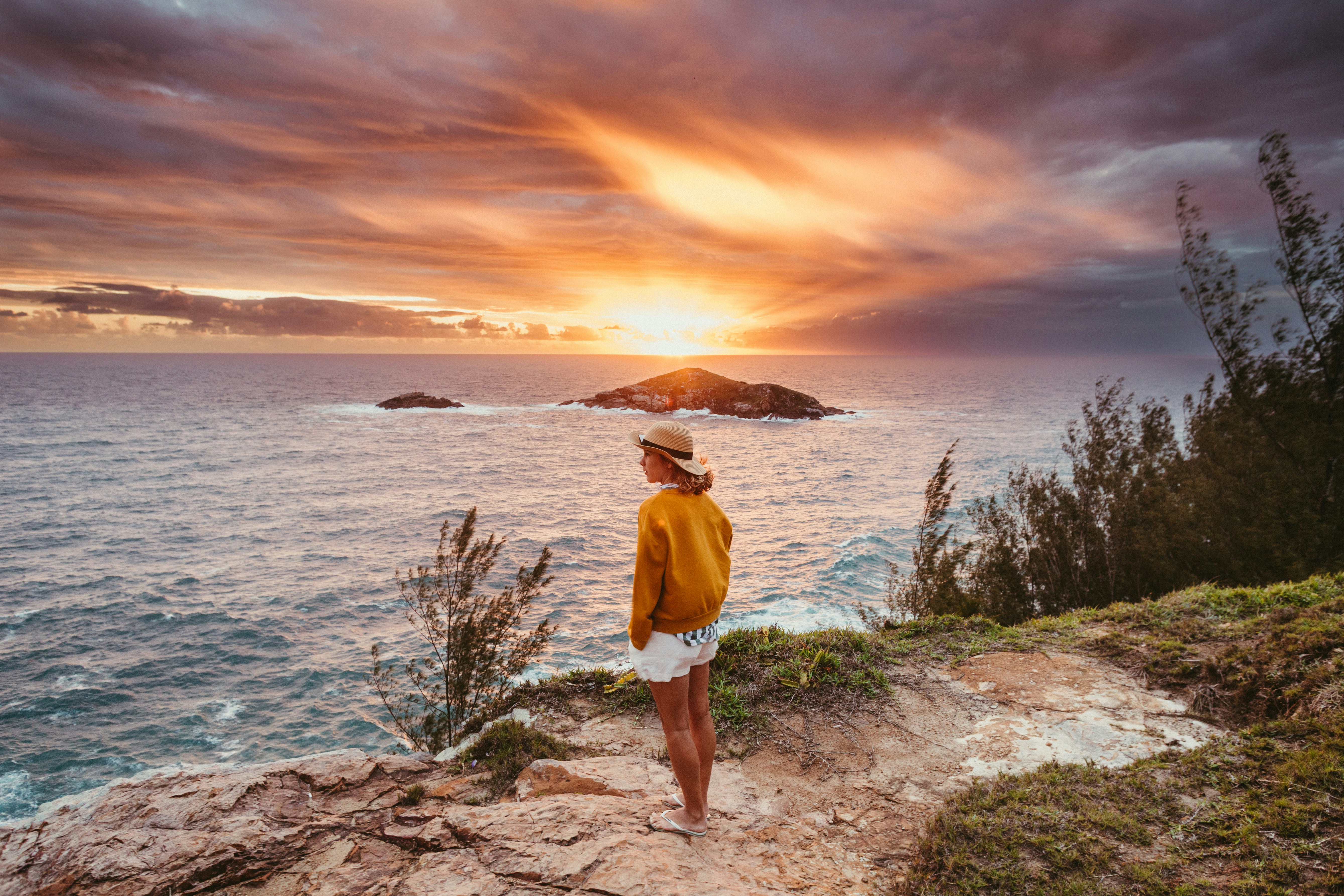 Golden Hour on the Clifftop: Solitude at the Edge of the Sea