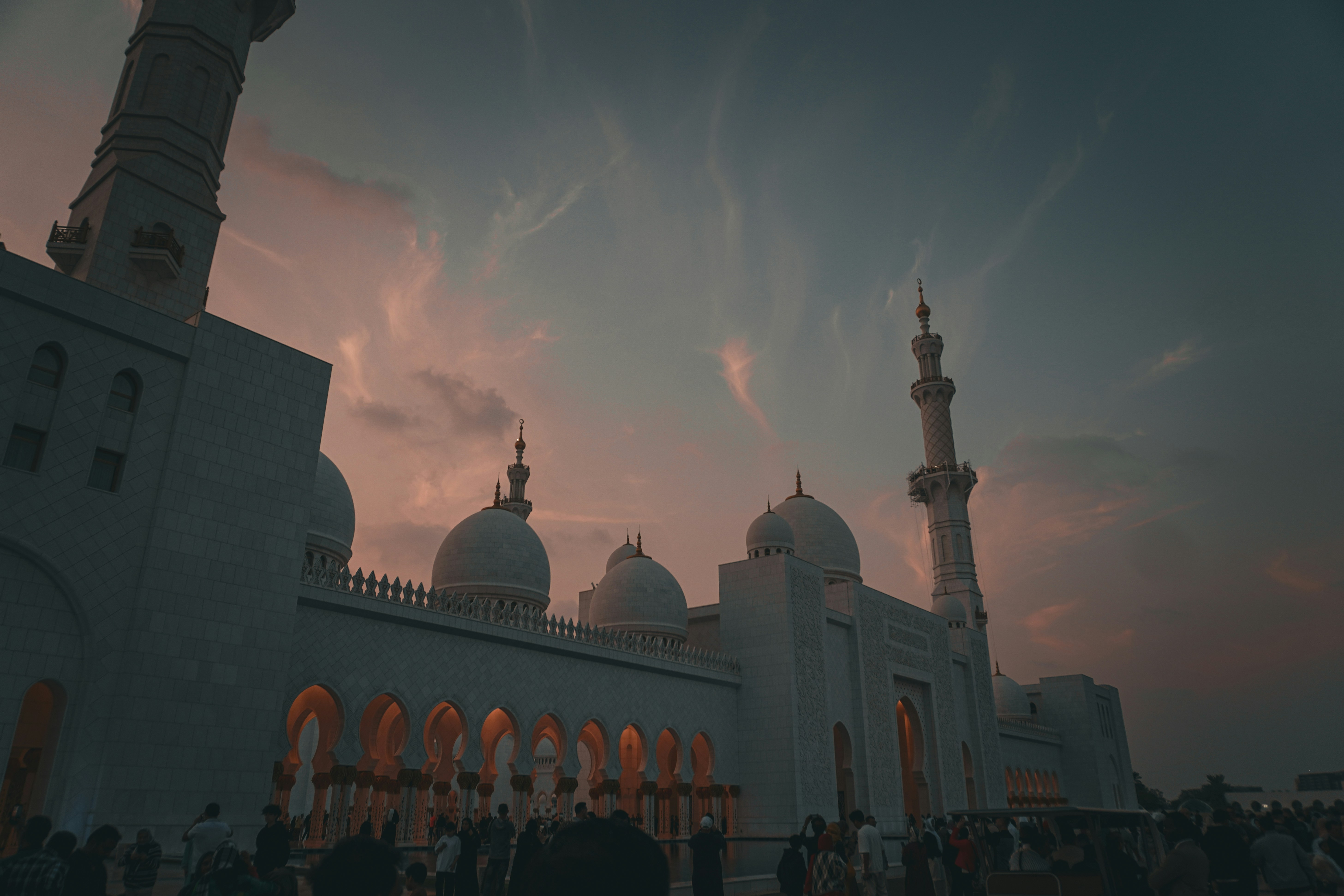 Dome and Dusk: A Mosque Silhouette Under a Peach Sky