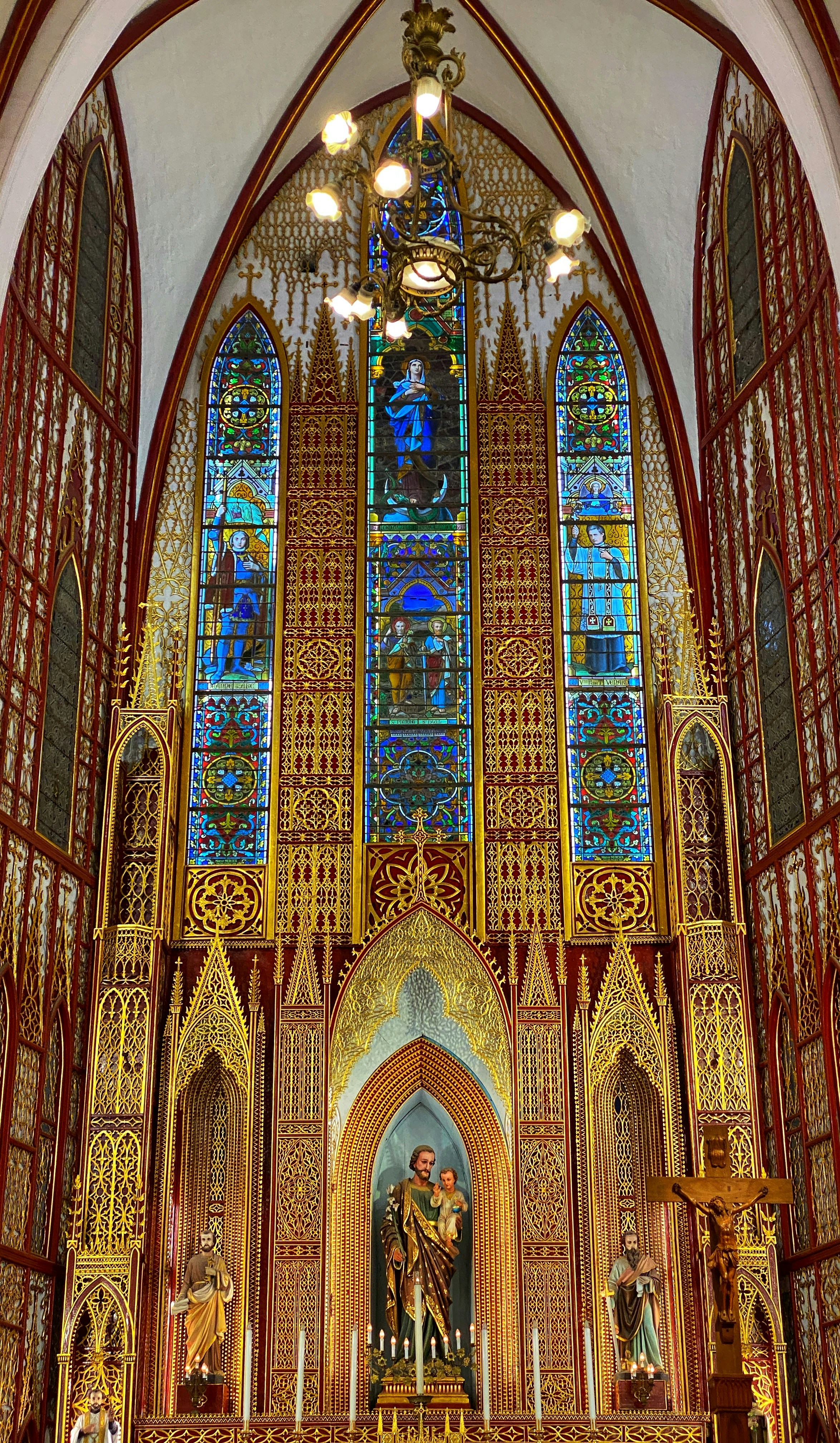 Gilded Cathedral: A Cathedral Altar Blooming with Stained Glass and Ironwork