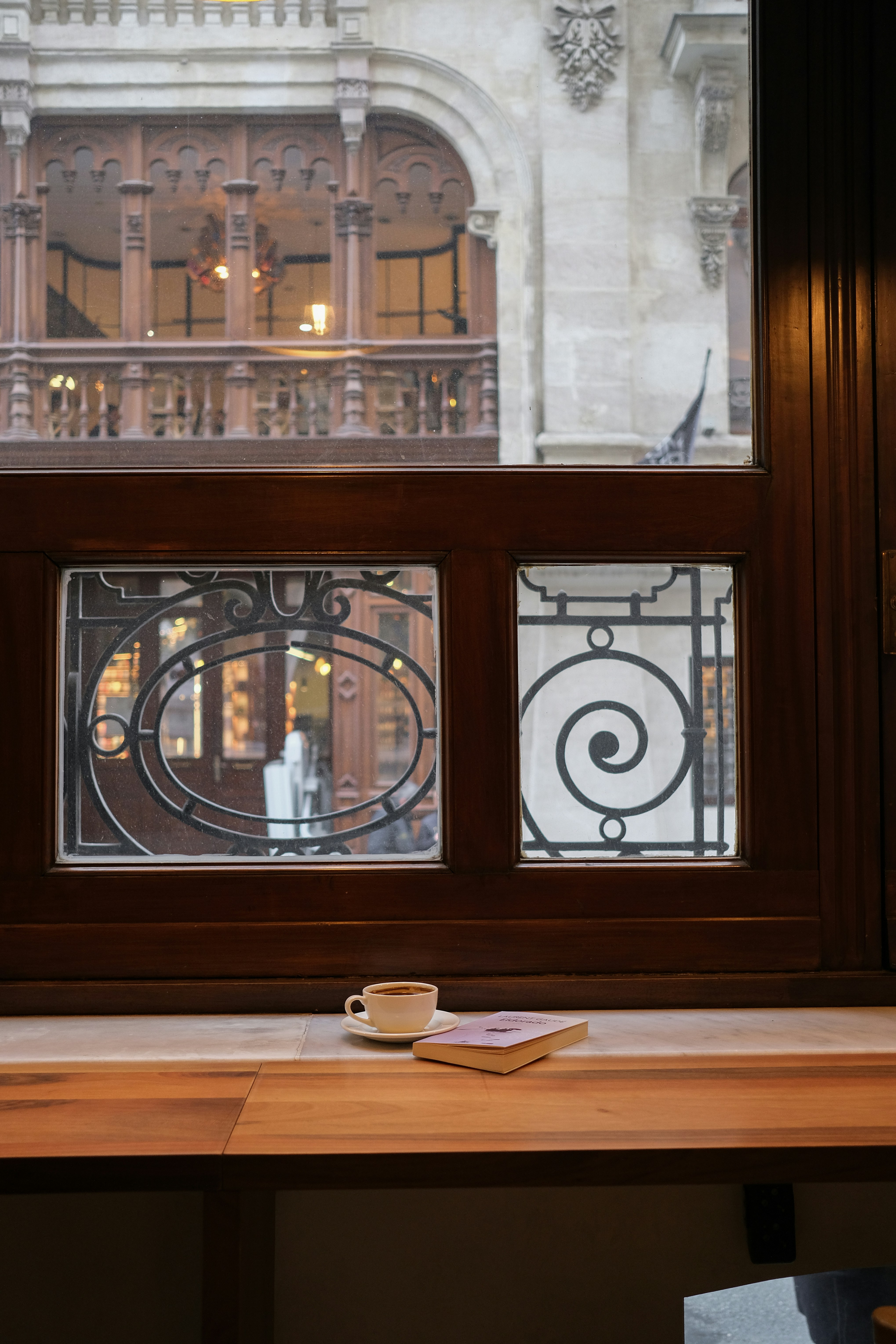 Coffee and Quiet in a City Window