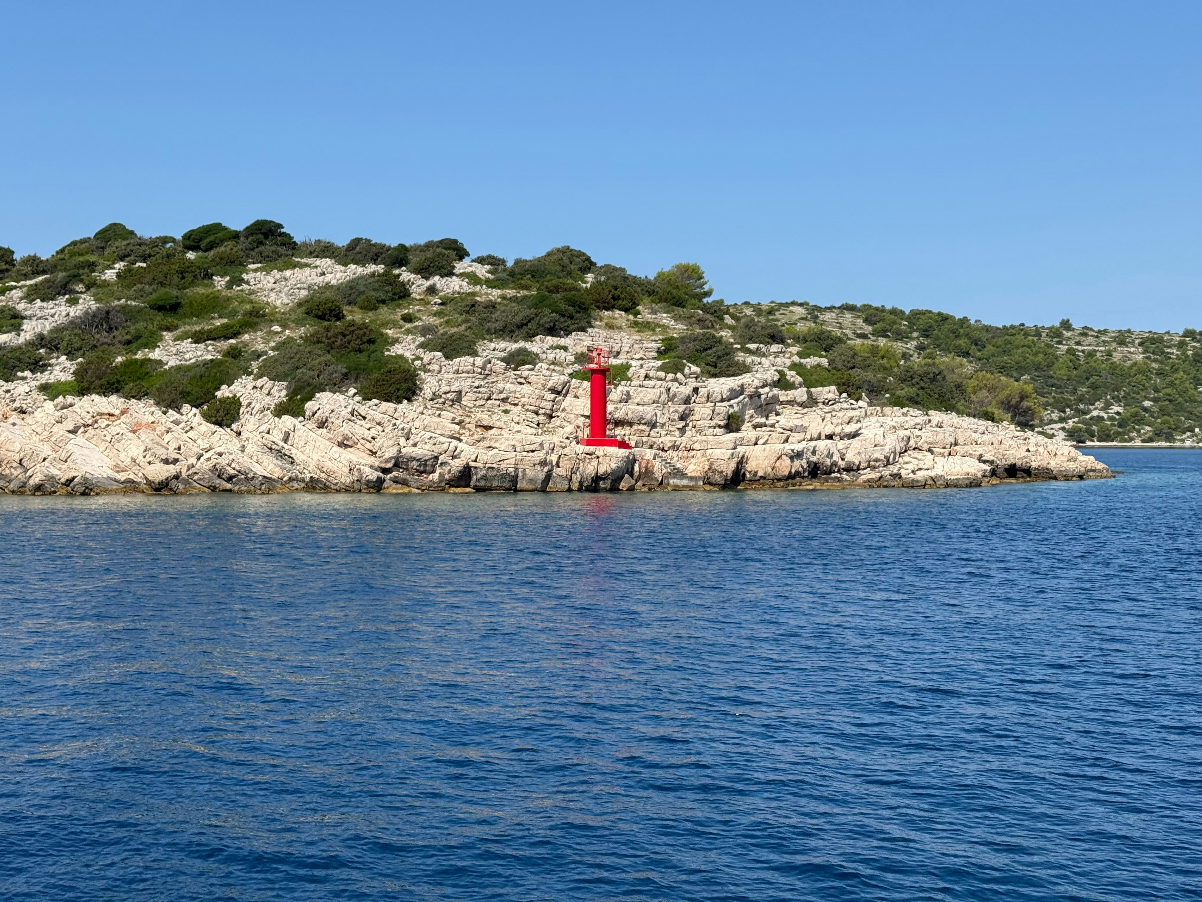 Red Lighthouse of the Quiet Cove