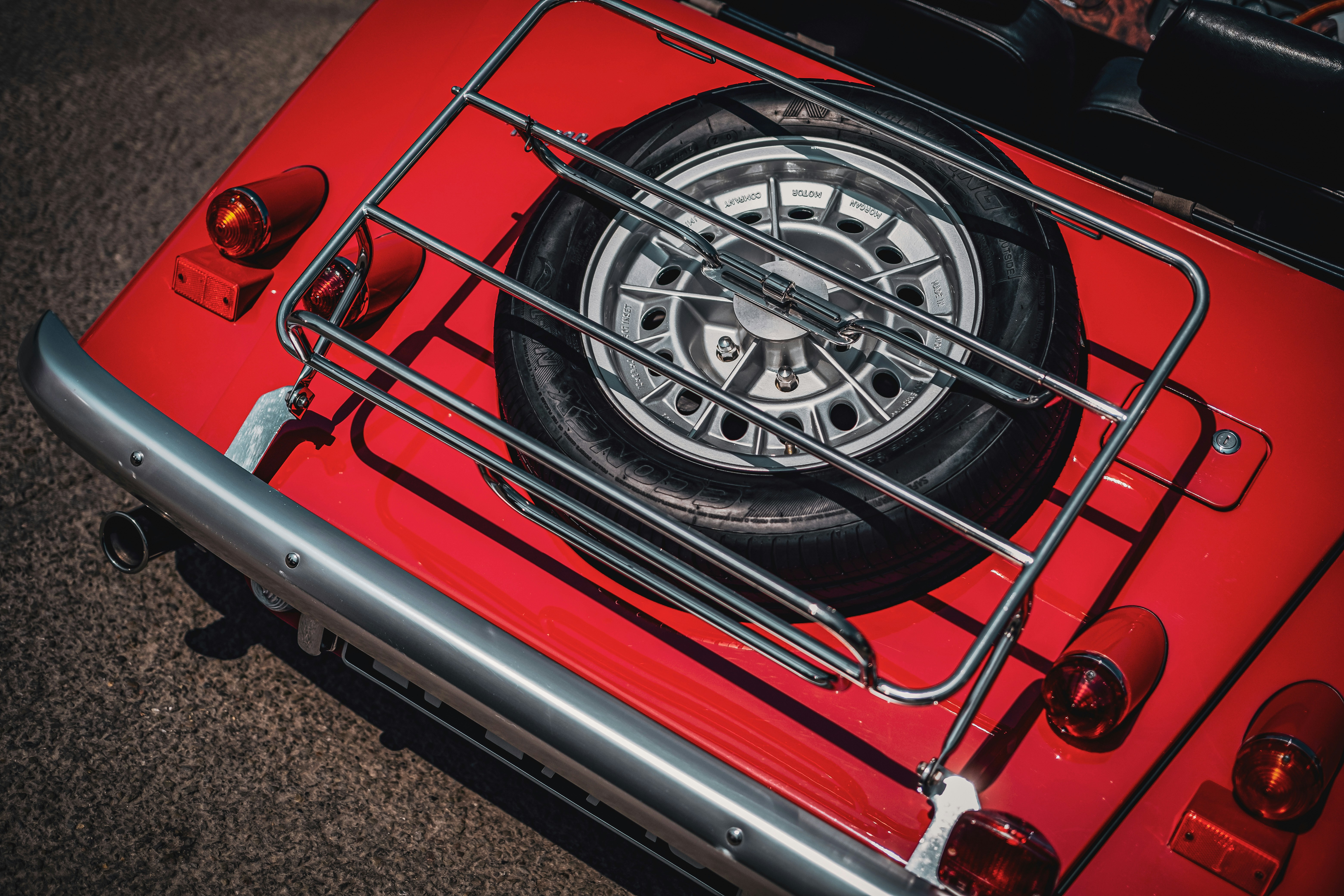Spare Spoked Heart: Spare Tire on a Red Vintage Jeep