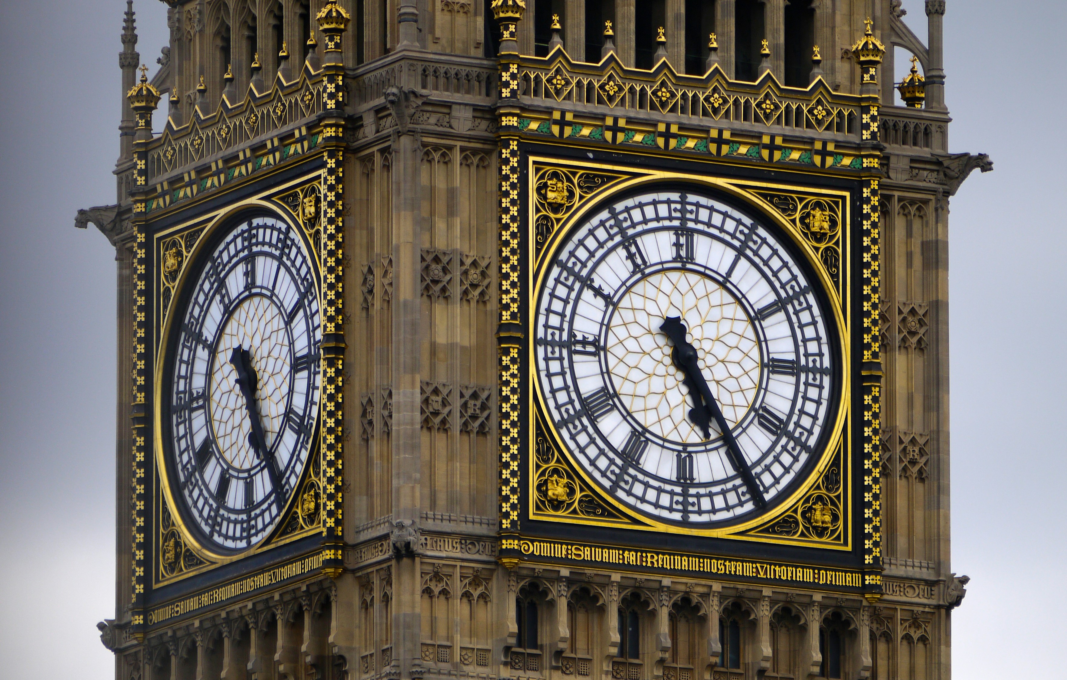 Close up photo of Big Ben clock face at 5:25