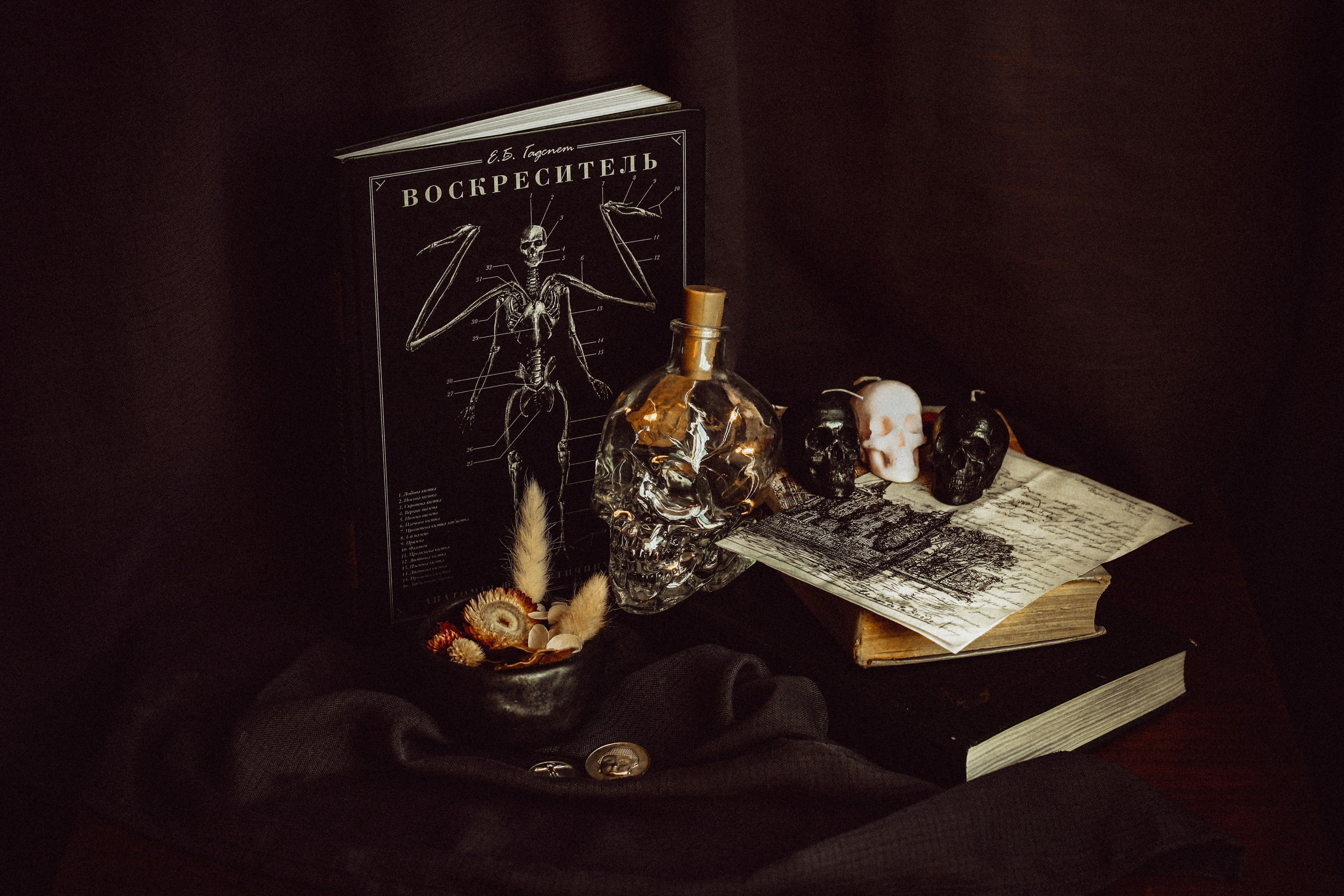 Ink and Echoes: A still life of occult tomes and relics in dusk-lit shadows