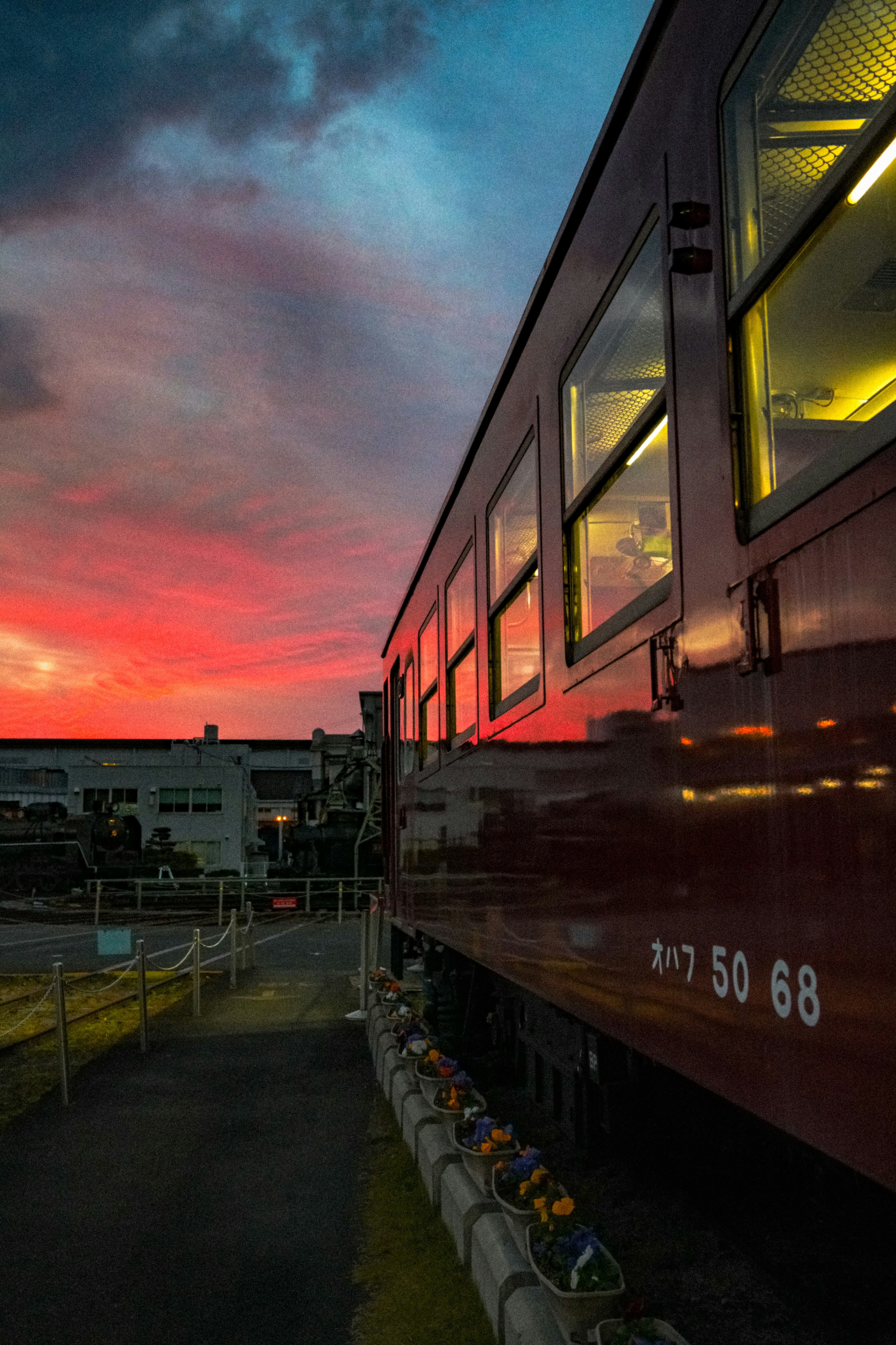 Dusk Train Car Adrift Along the Sunset Promenade