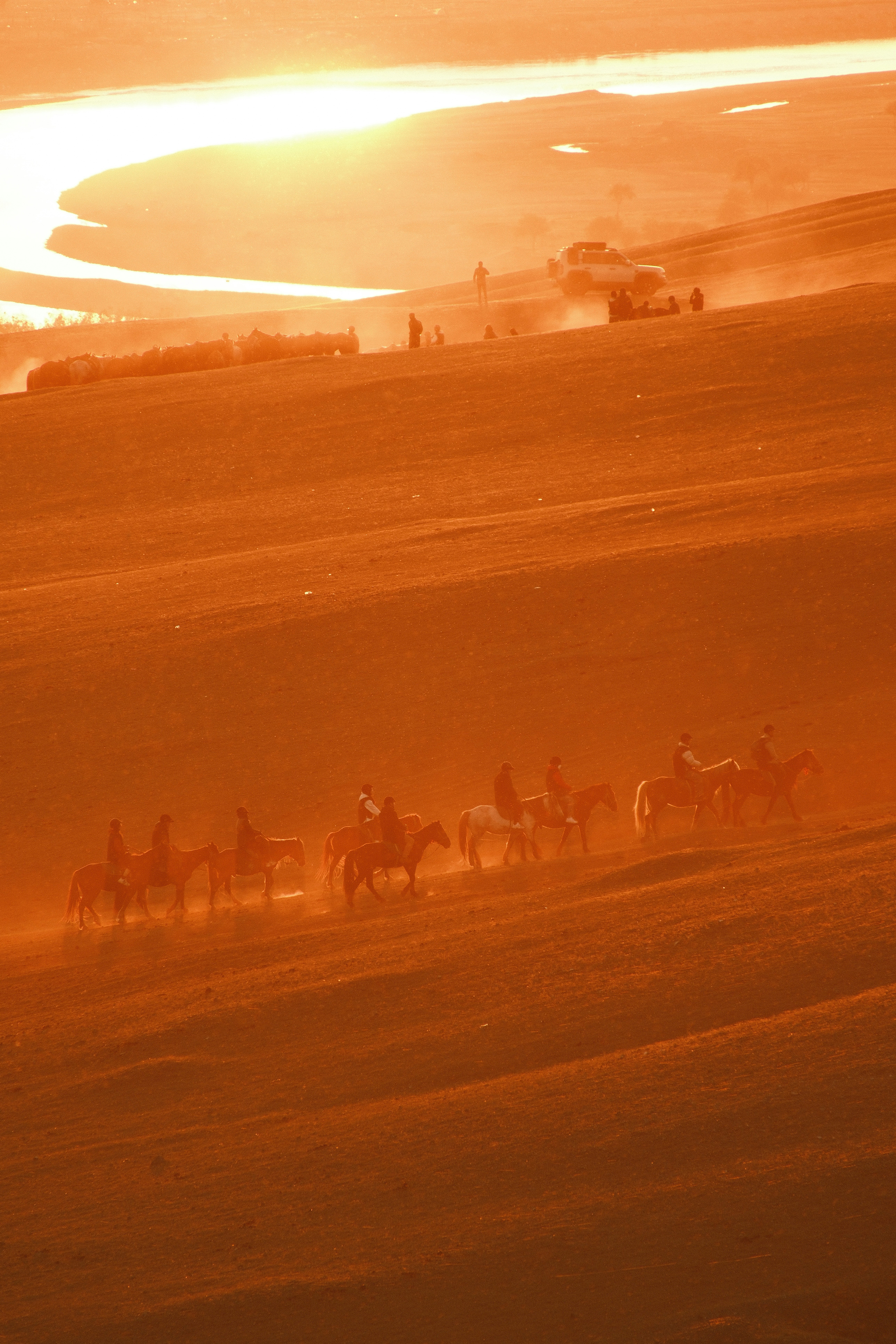 Sunset Caravan: A Pipeline of Silhouettes Across a Golden Hill