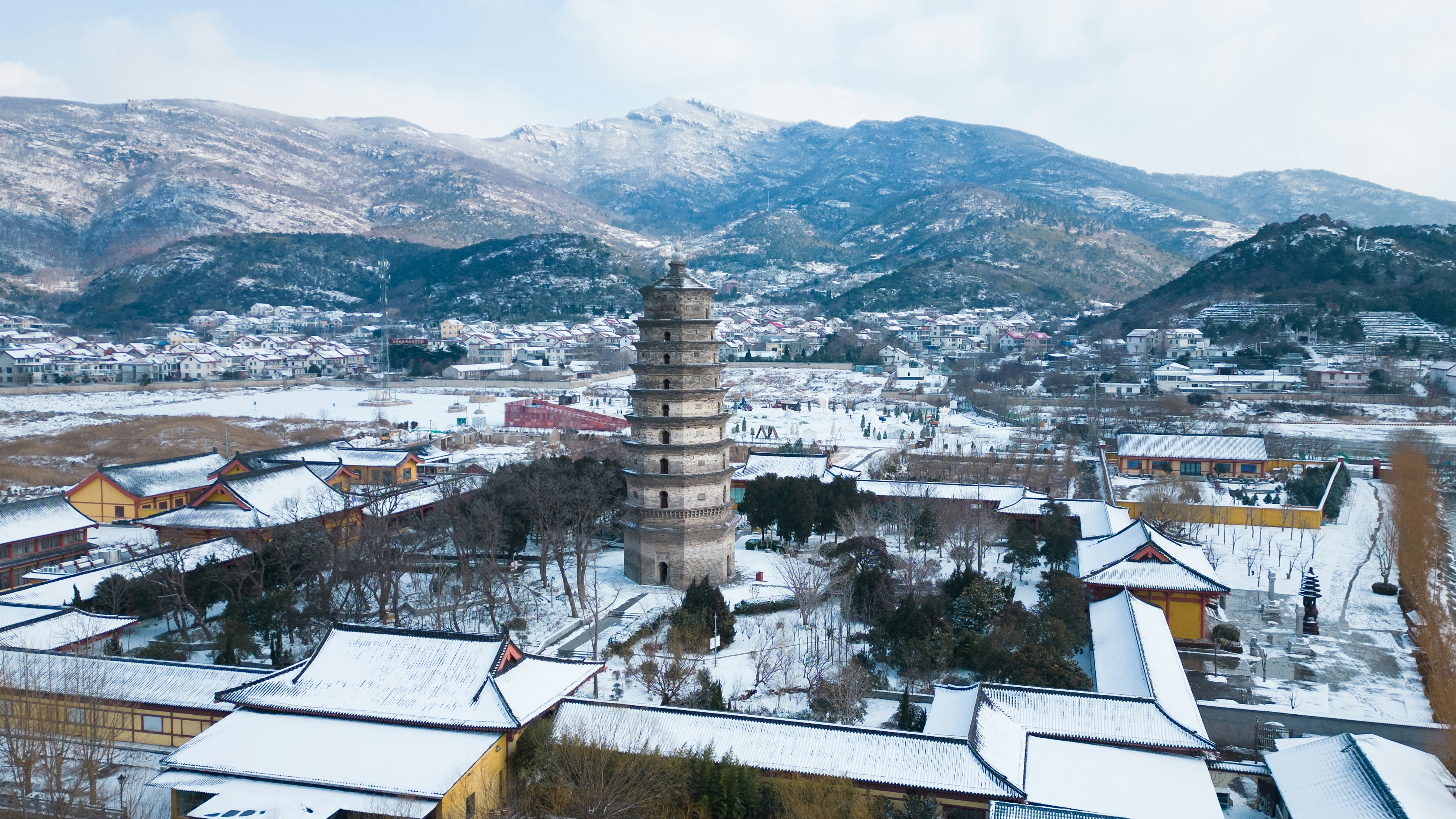 Snowbound Pagoda: A Framed Winter Landscape Over a Quiet Lake