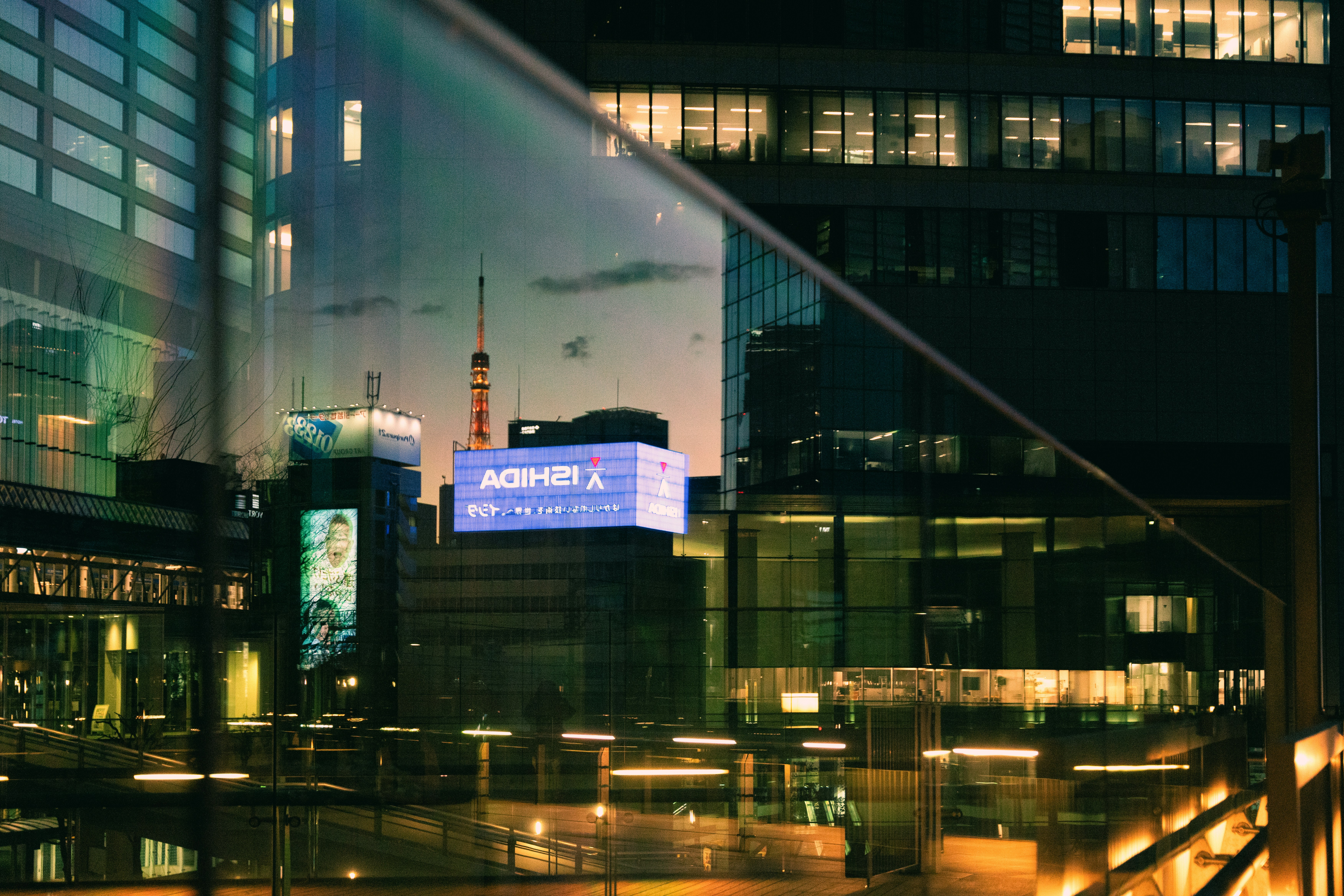 Night Geometry: Reflective Glass and City Lights