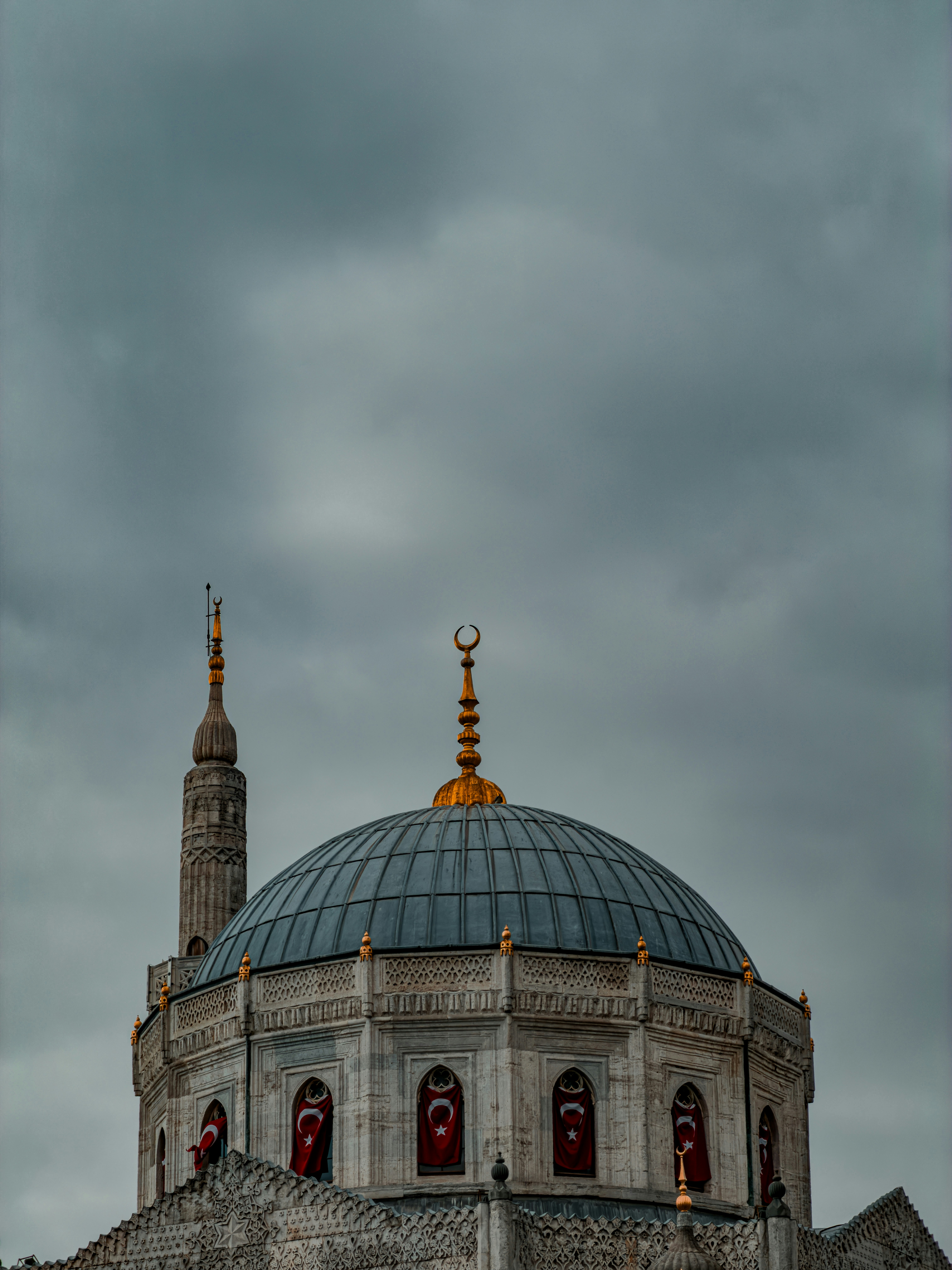 Dome and Minarets Silhouetted Against Stormy Sky