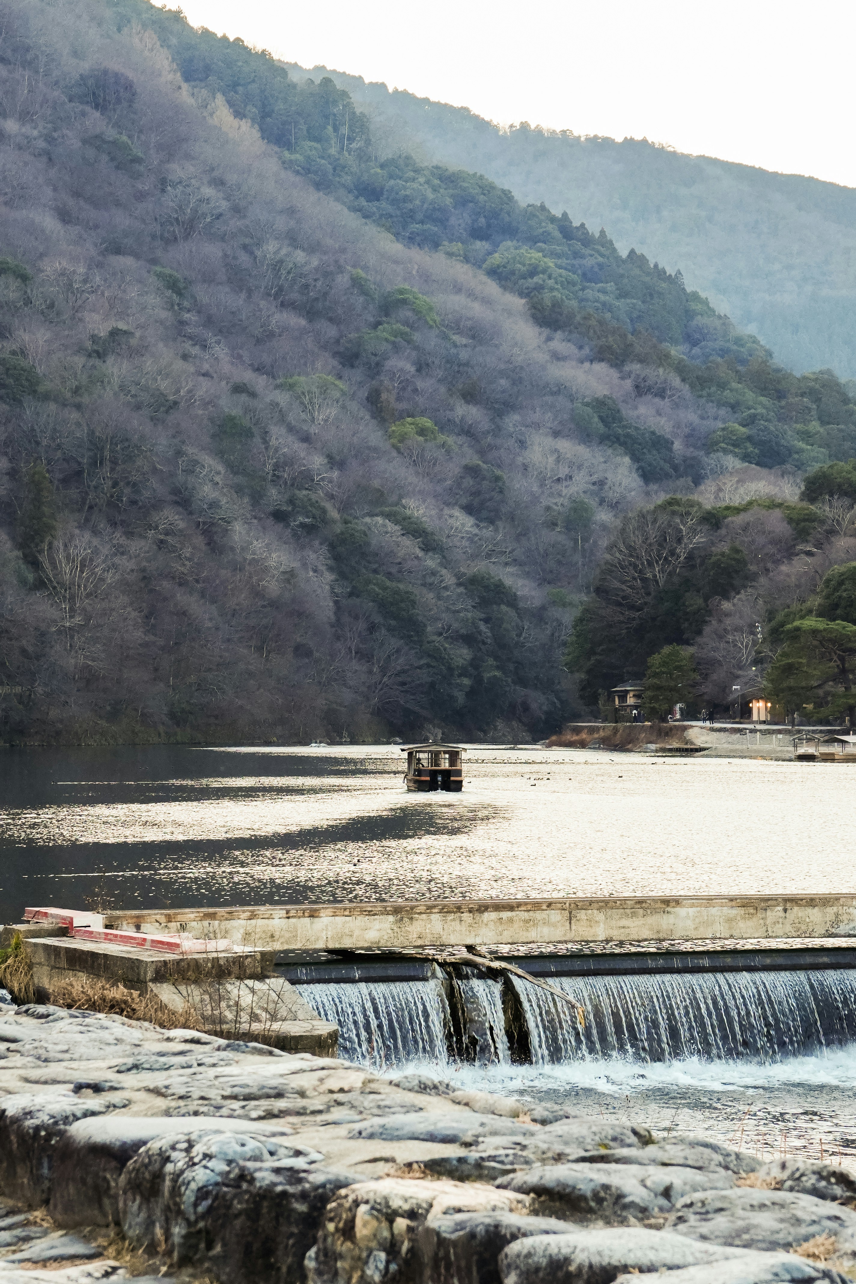 Misty Lakeside Steps: A Quiet Dawn at the Dam